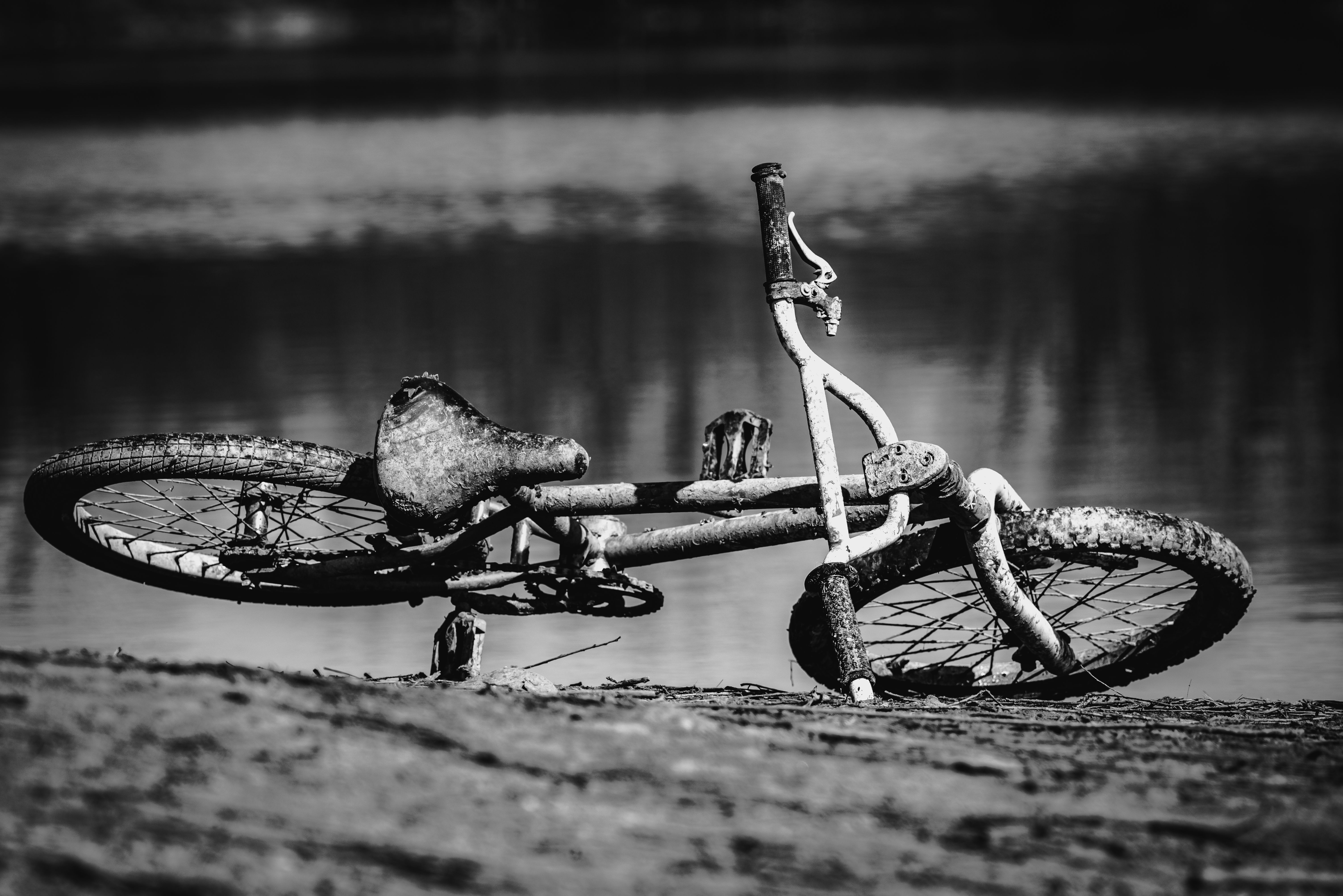 Dirty Bike Lying on the Beach · Free Stock Photo