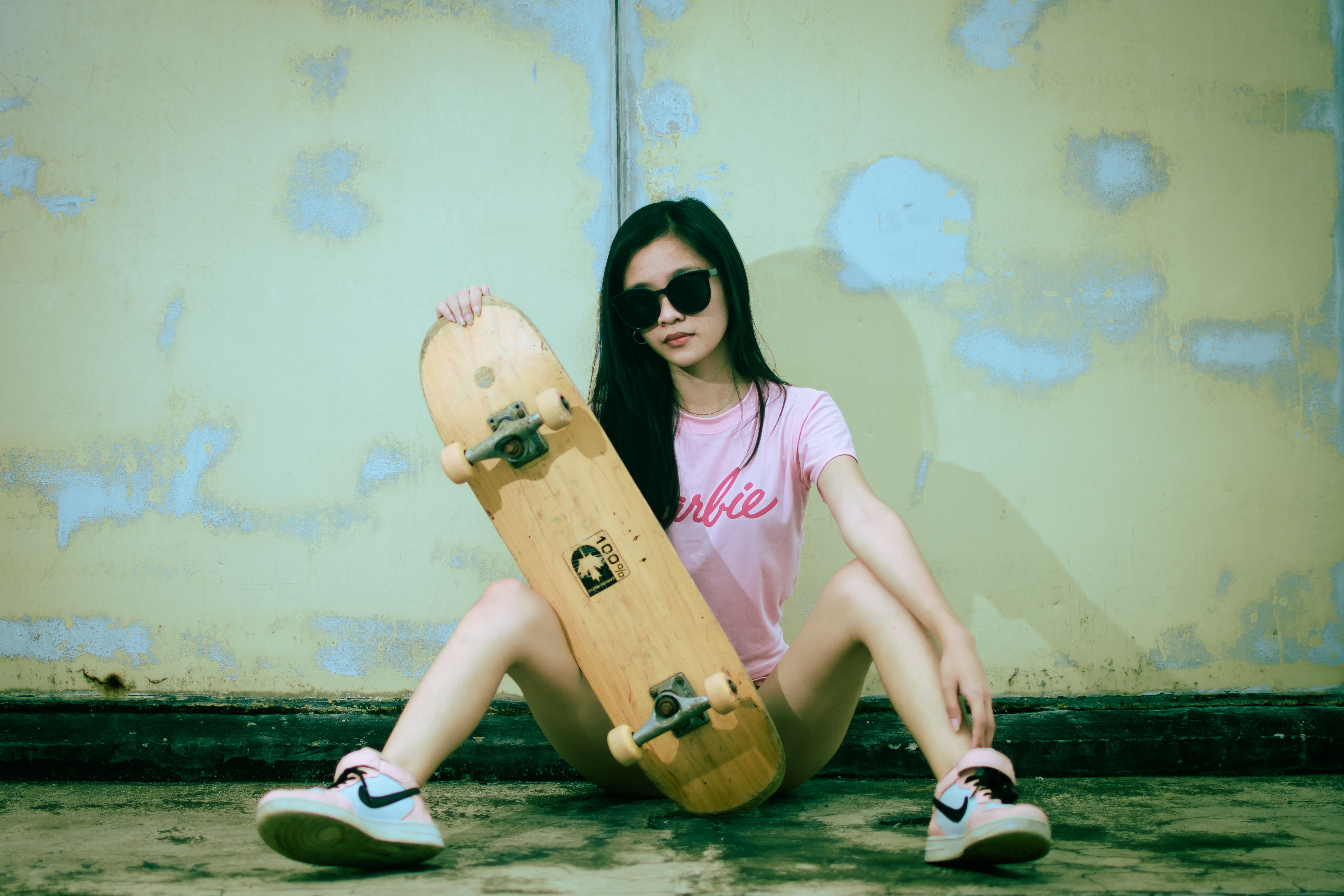 Photo of a Cool Young Woman Sitting in a Room · Free Stock Photo