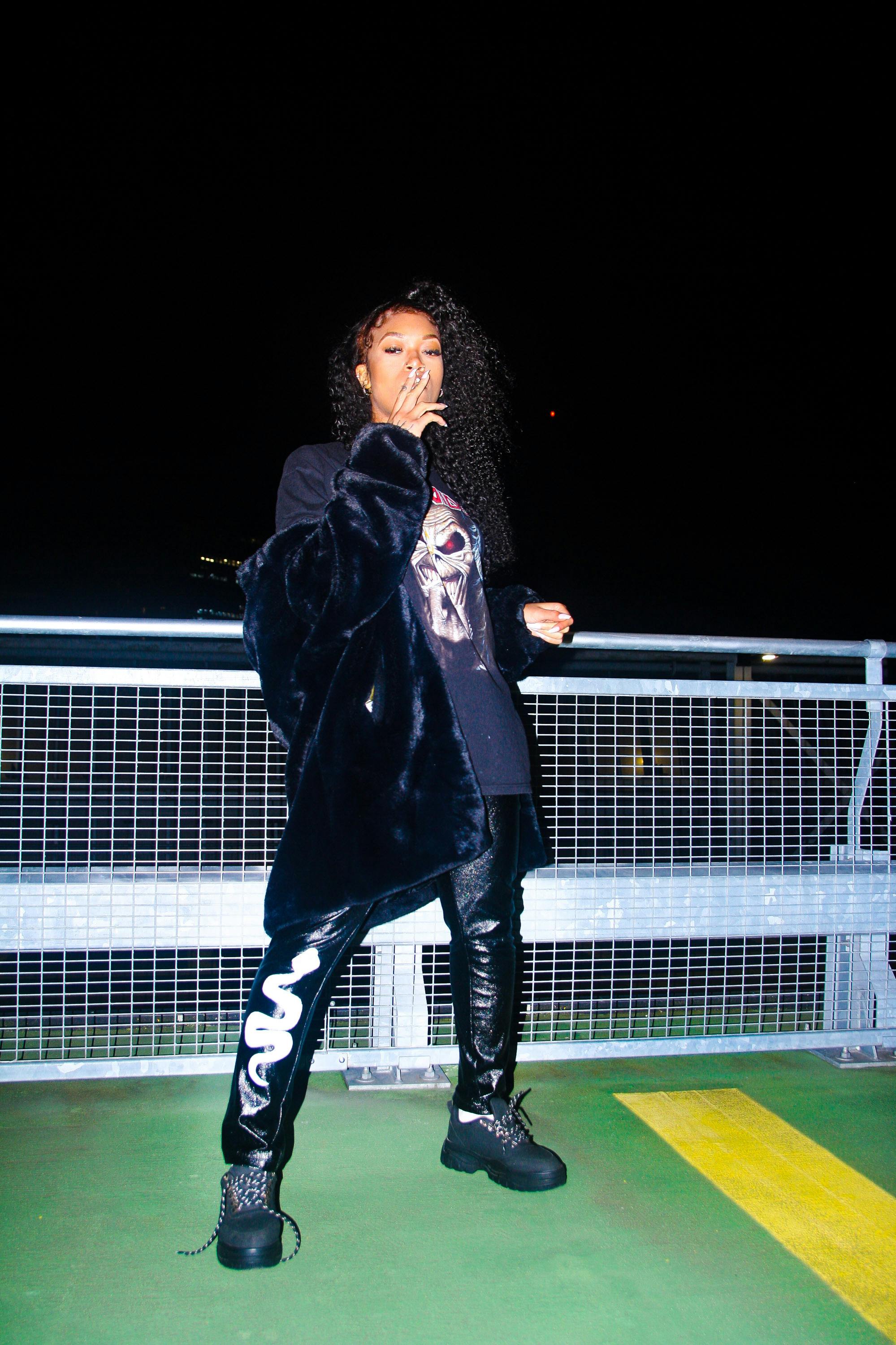 Woman in Elegant Crop Top Smoking Cigarette · Free Stock Photo