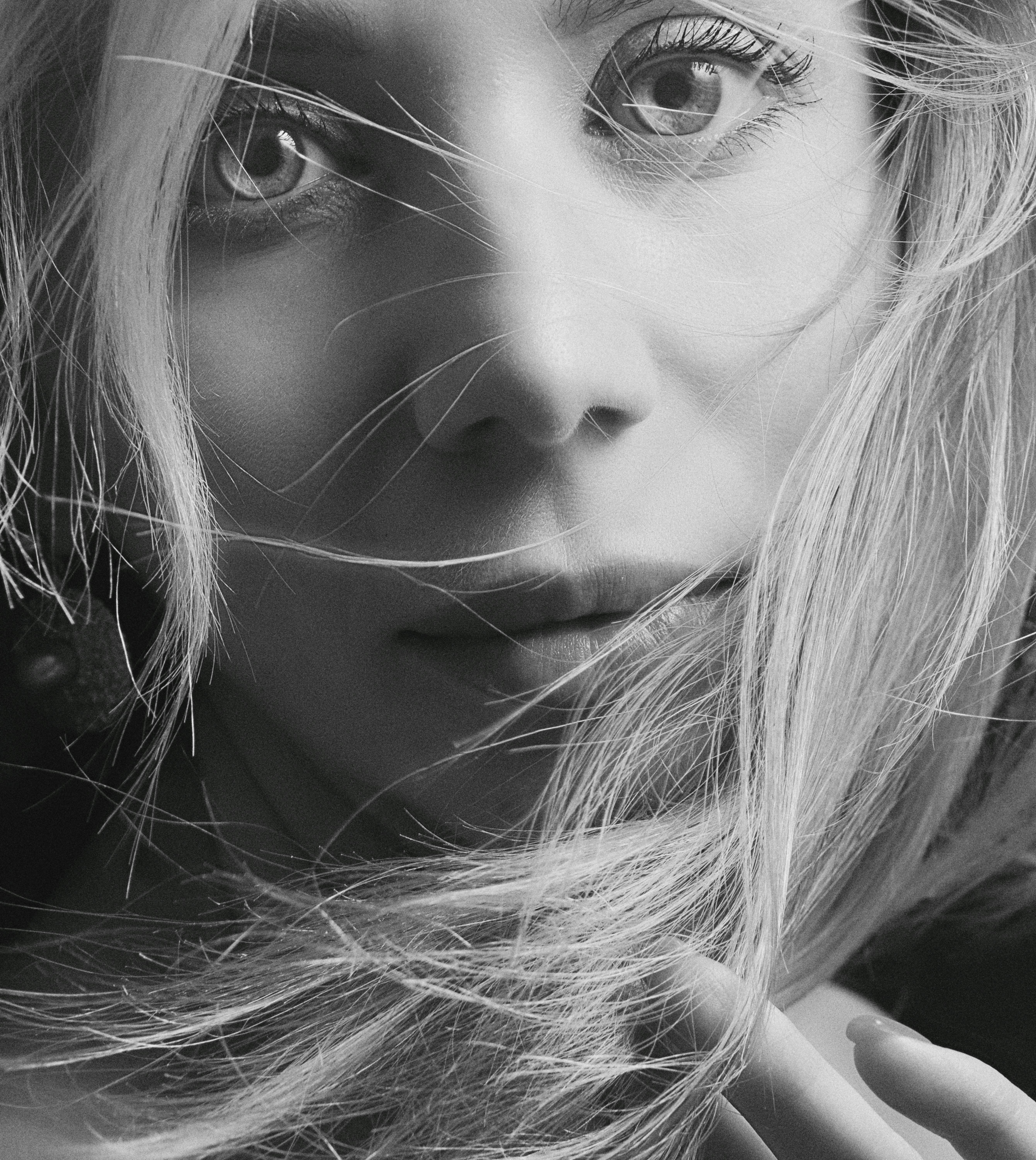 Black and White Closeup Portrait of a Blonde Woman with Tousled Hair ...
