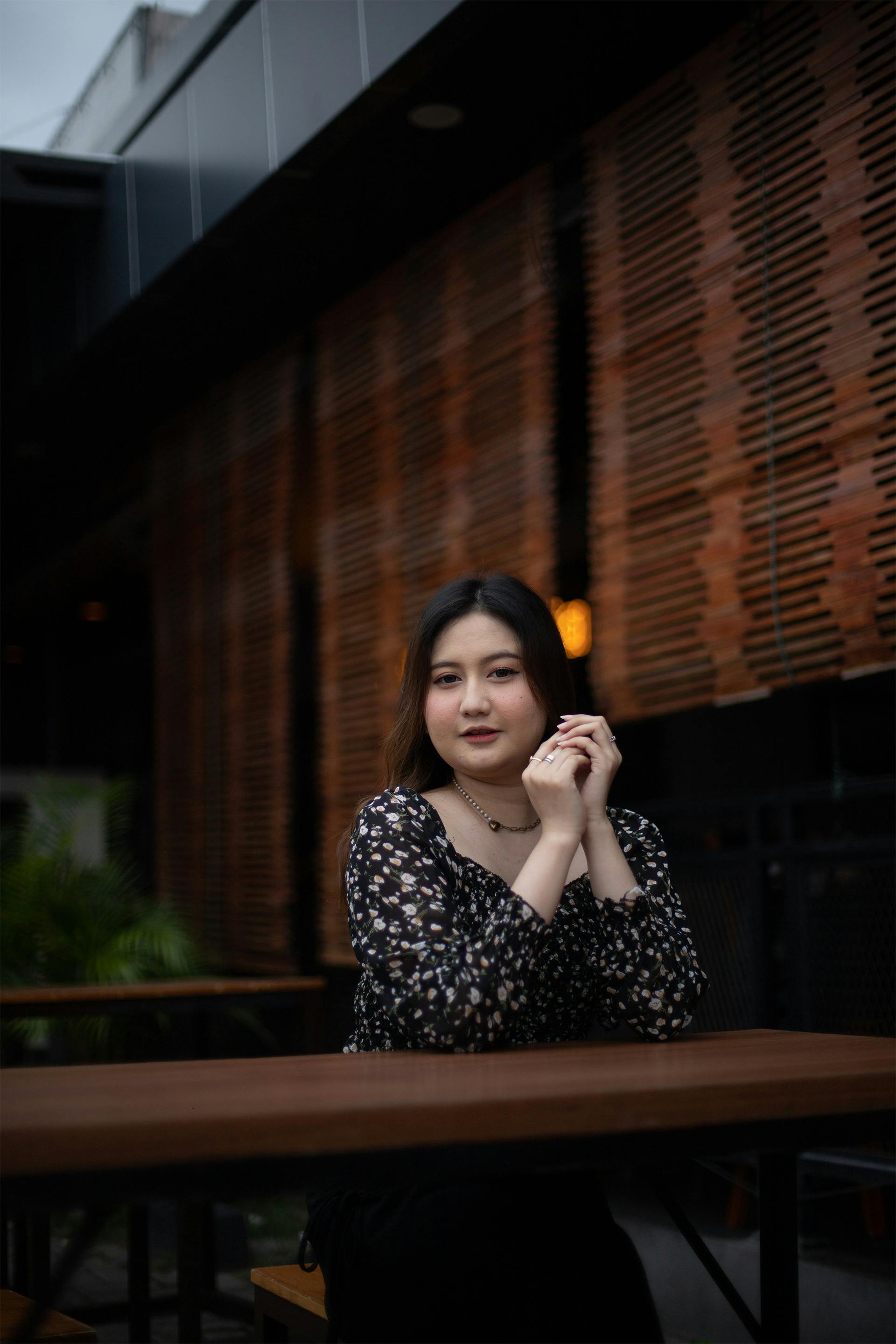 Woman Sitting by Table and Thinking · Free Stock Photo
