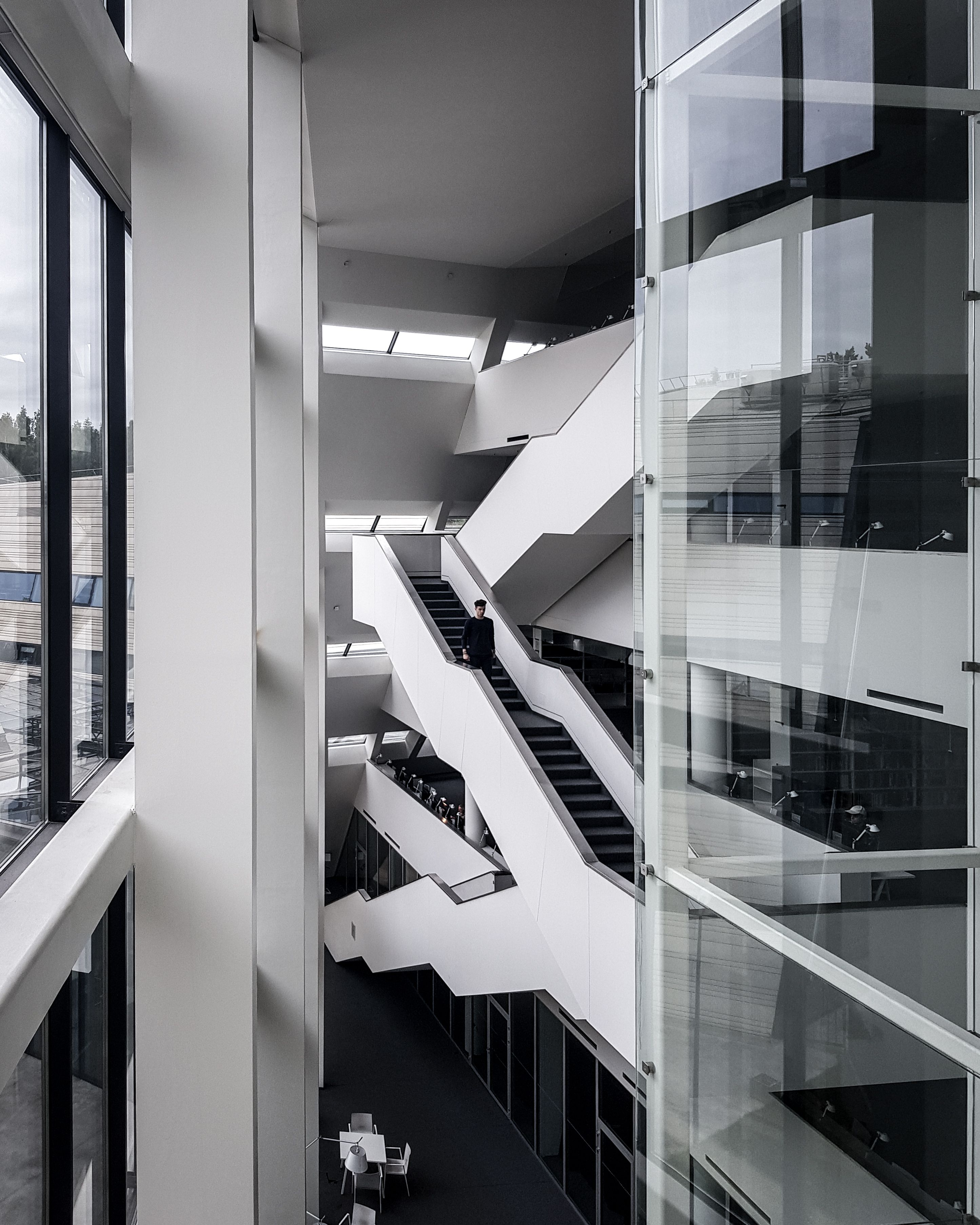Person Walking Along Downstairs · Free Stock Photo