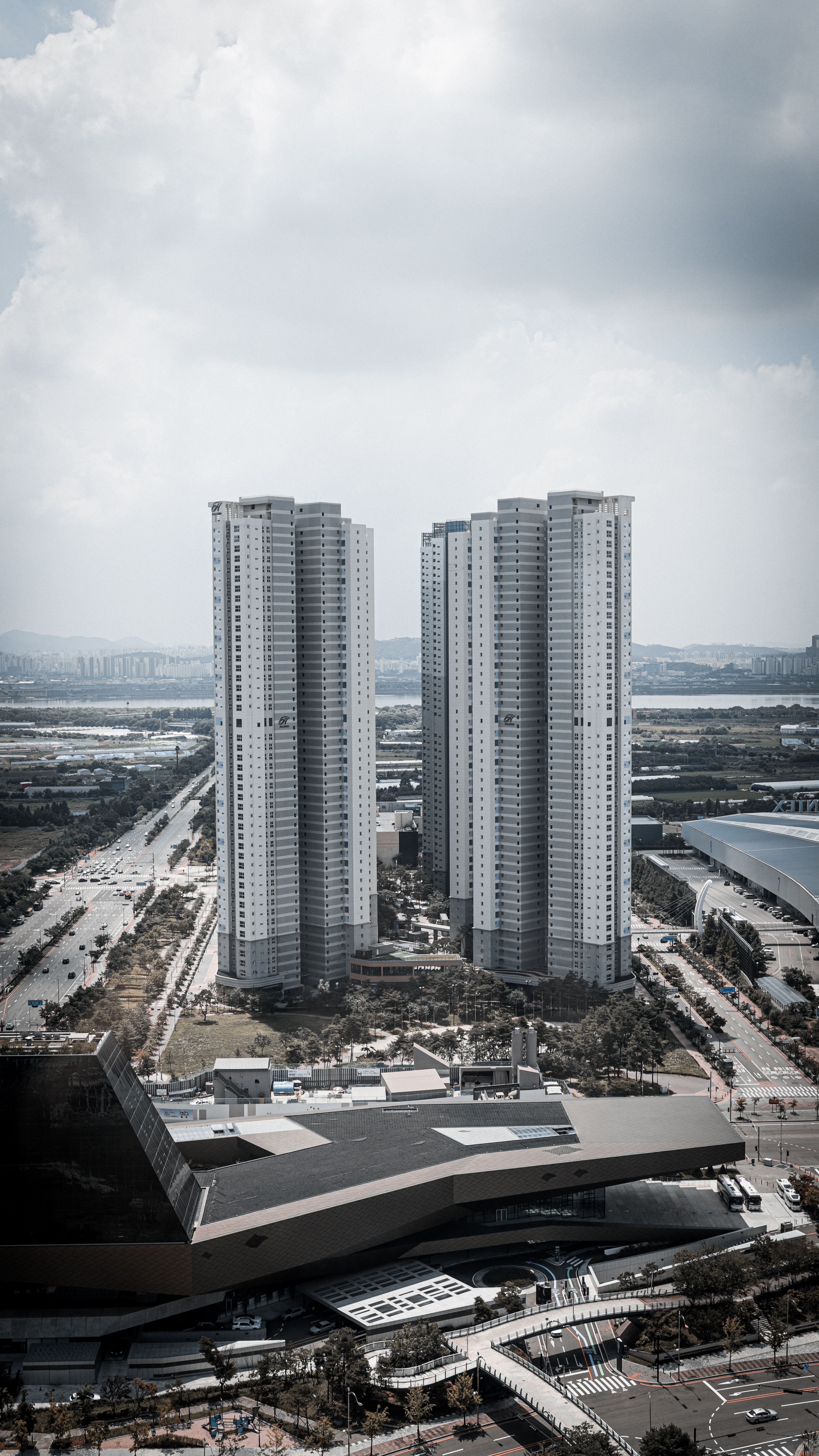Two tall buildings are shown in this aerial photo · Free Stock Photo