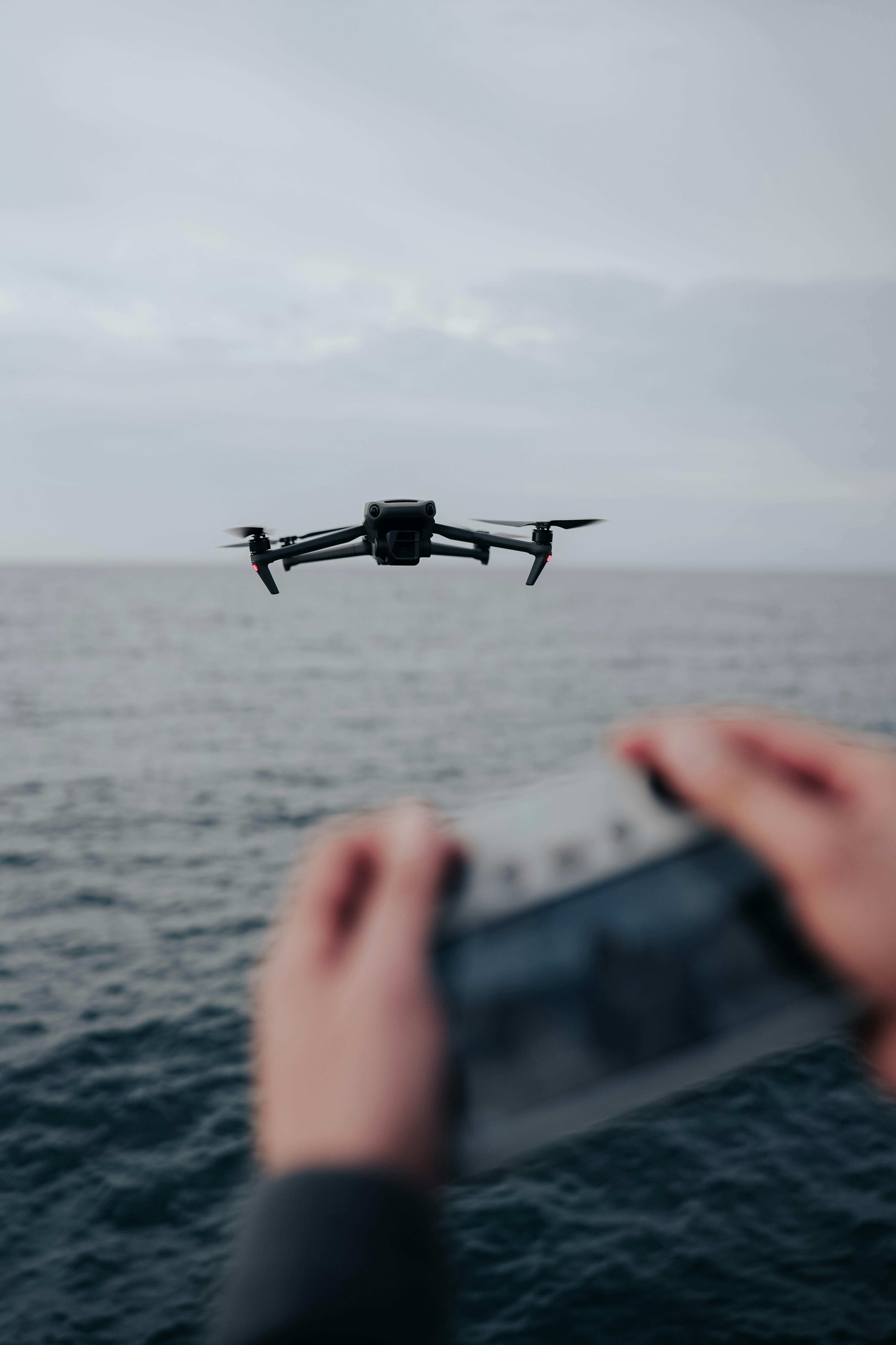 Drone Hovering above the Water · Free Stock Photo
