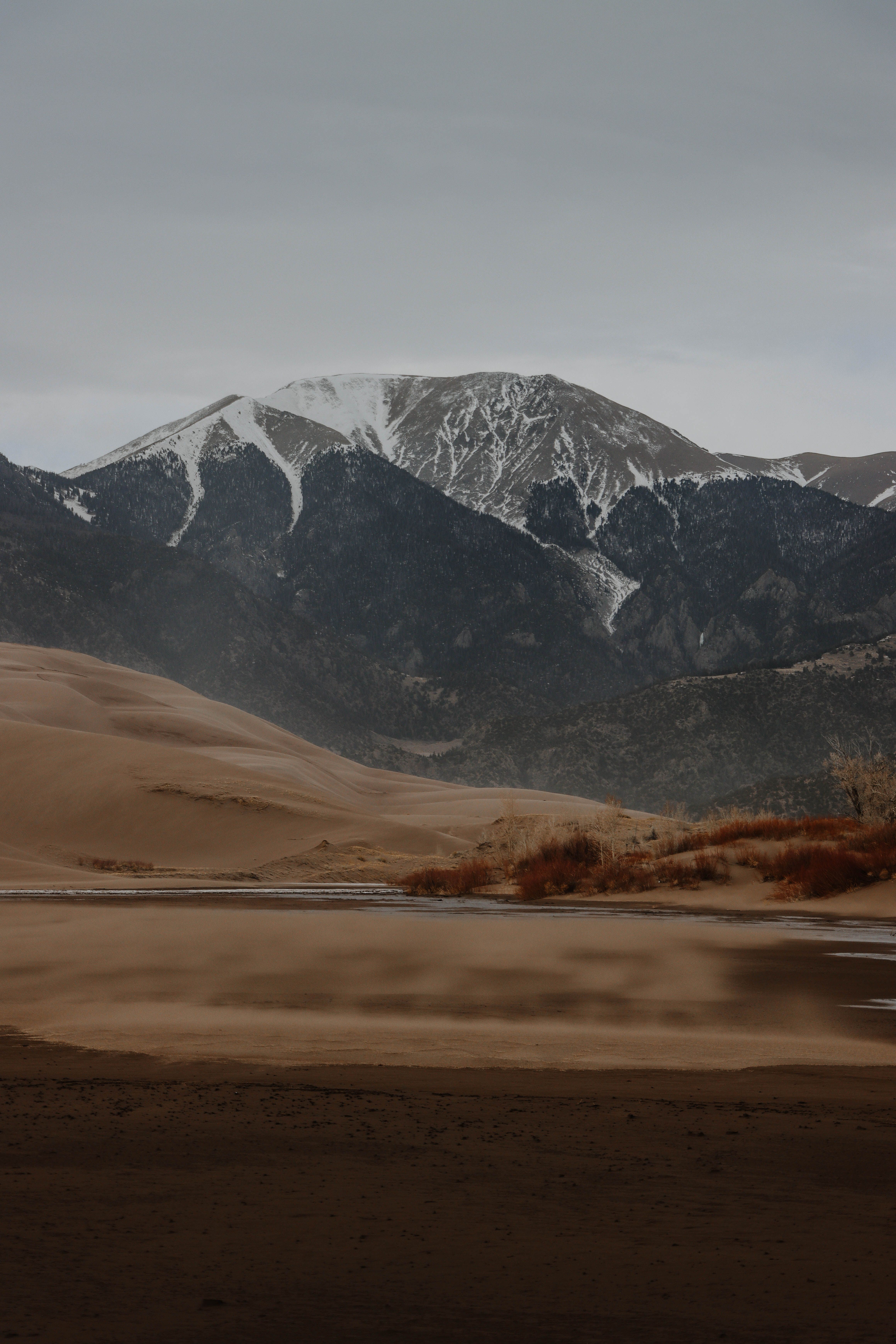 Sand Dunes and Mountains Landscape · Free Stock Photo