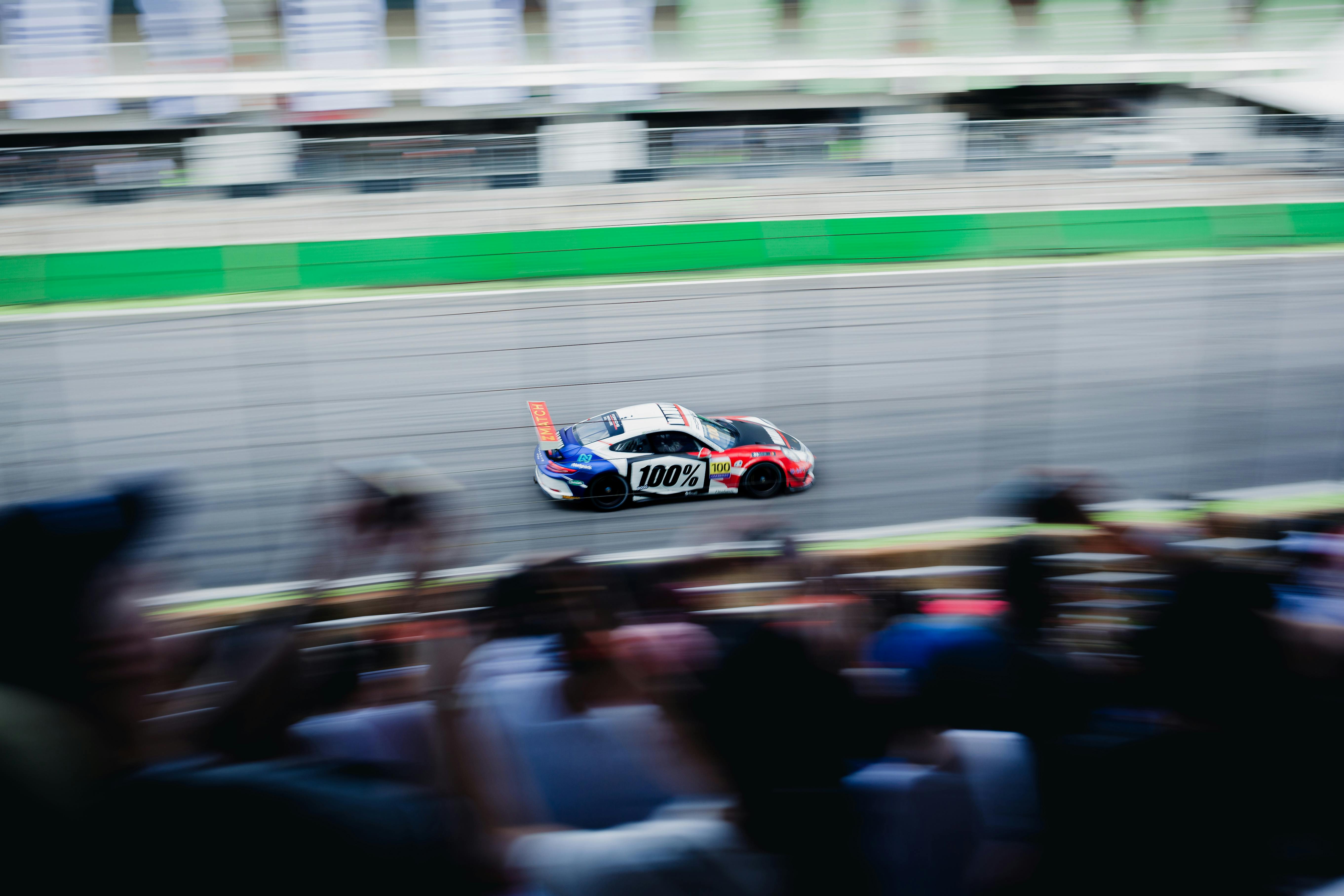 Racing Car Running on Track · Free Stock Photo