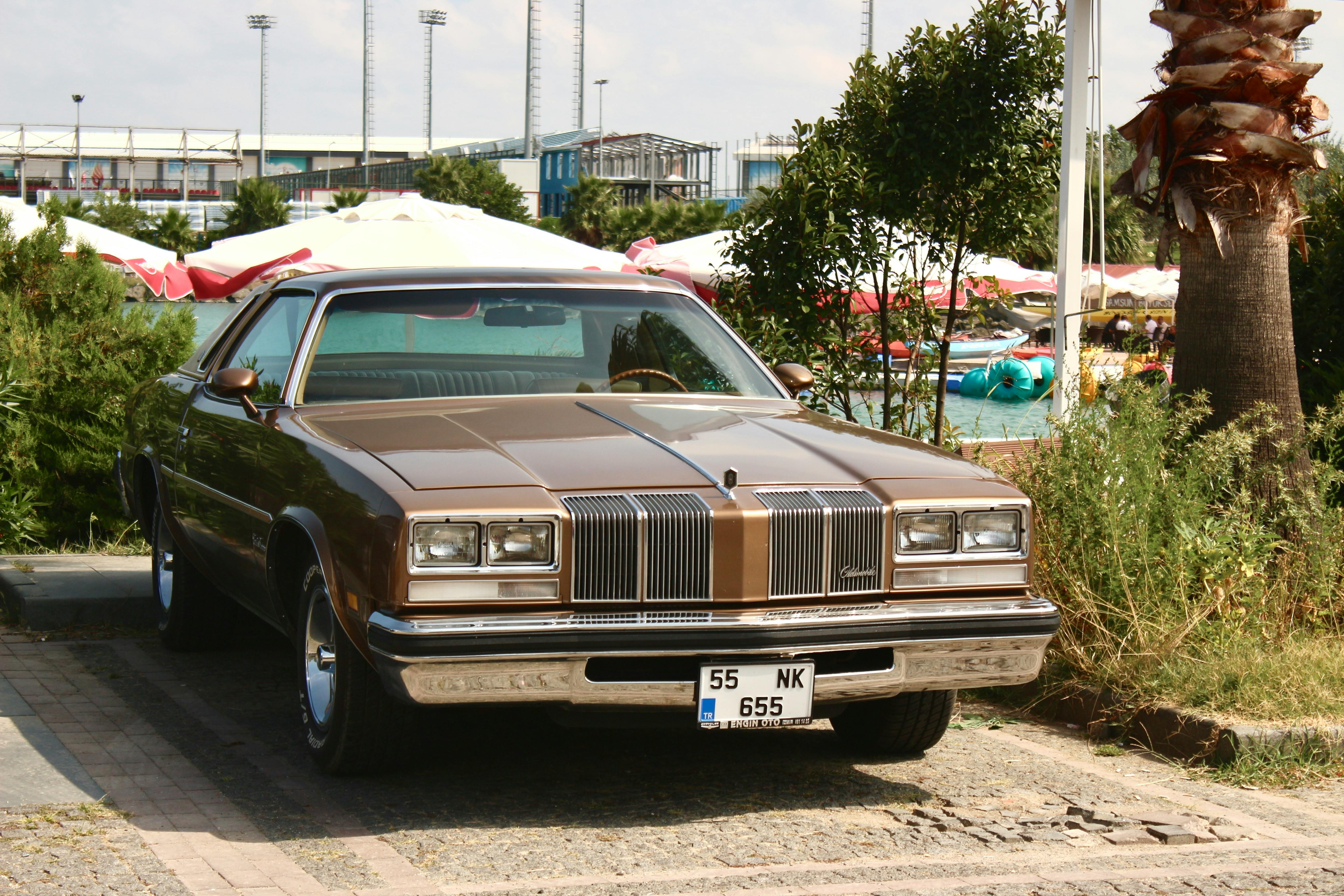 Parked Oldsmobile Cutlass · Free Stock Photo