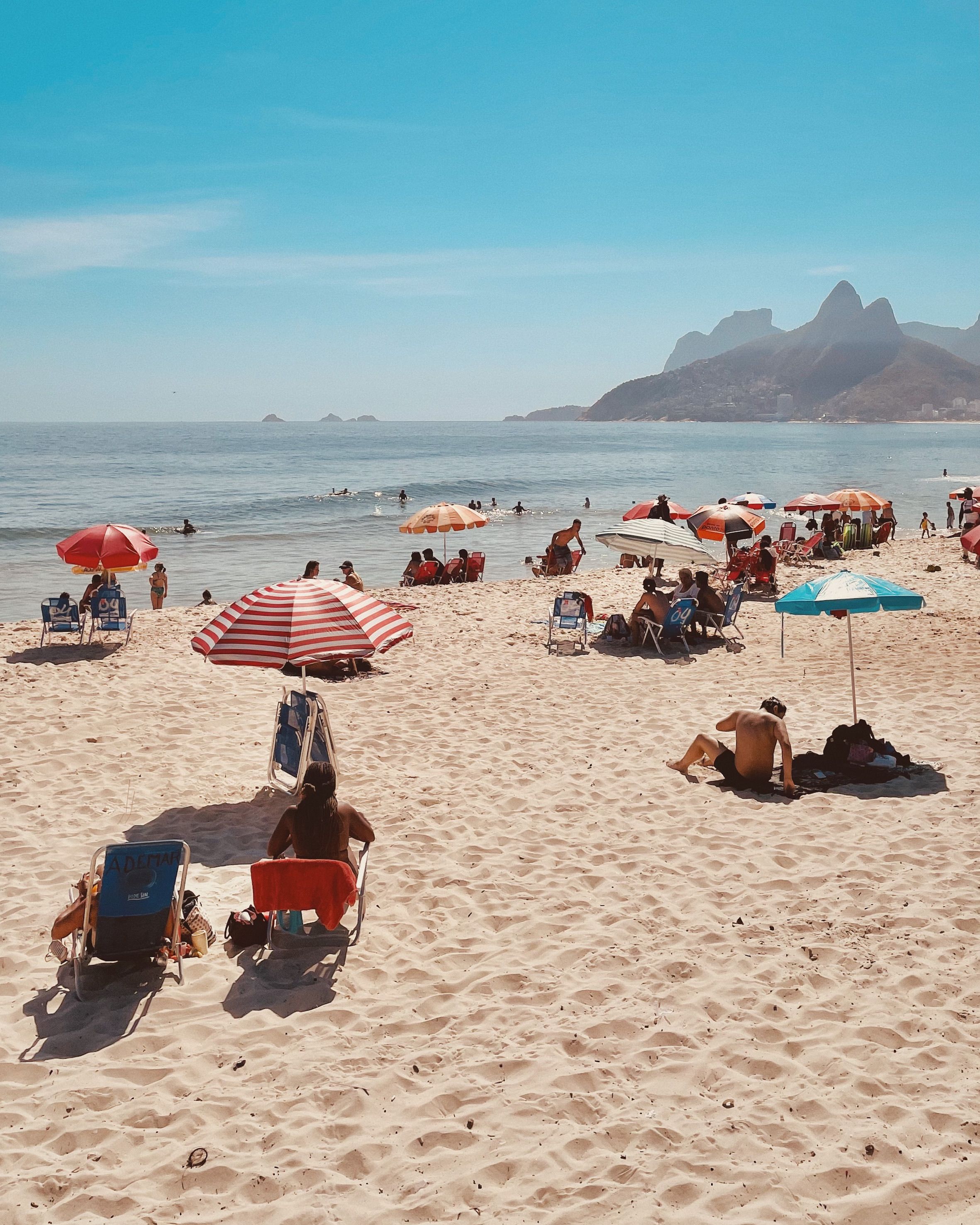 People on Sand Beach near Sea · Free Stock Photo