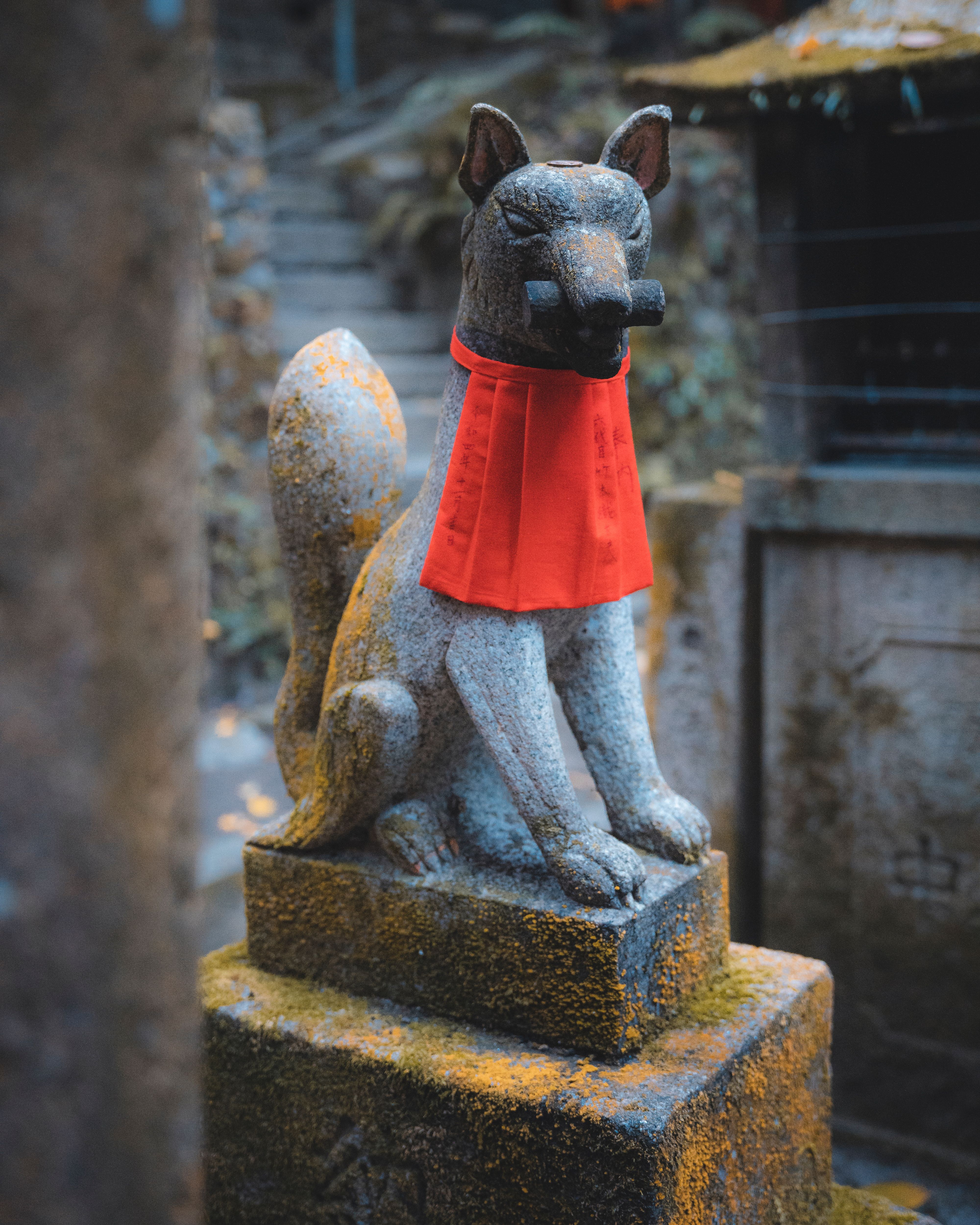 Photo of a Stone Statue of a Fox in the Park · Free Stock Photo