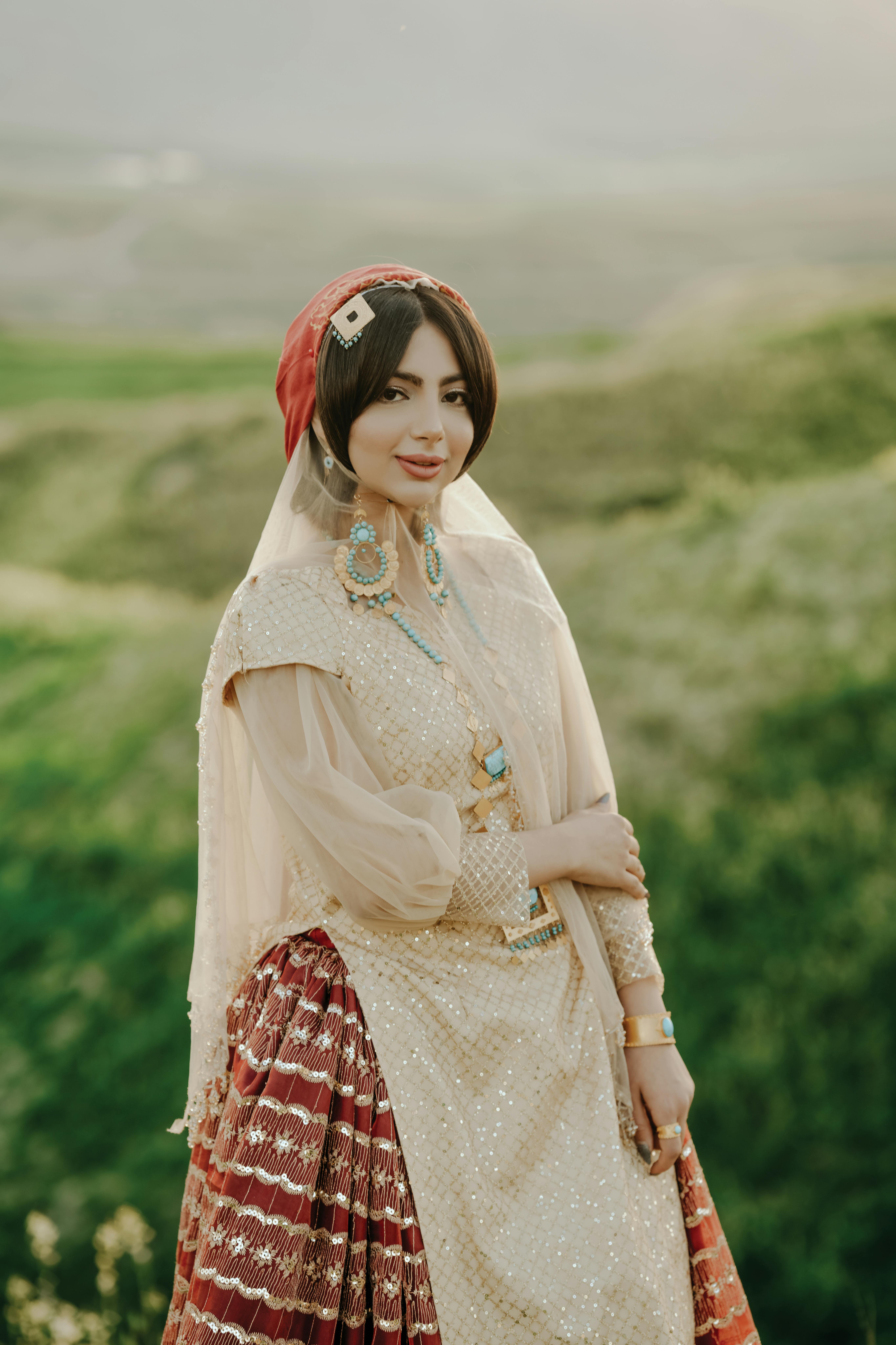 Beautiful Brunette Woman in Traditional Dress · Free Stock Photo