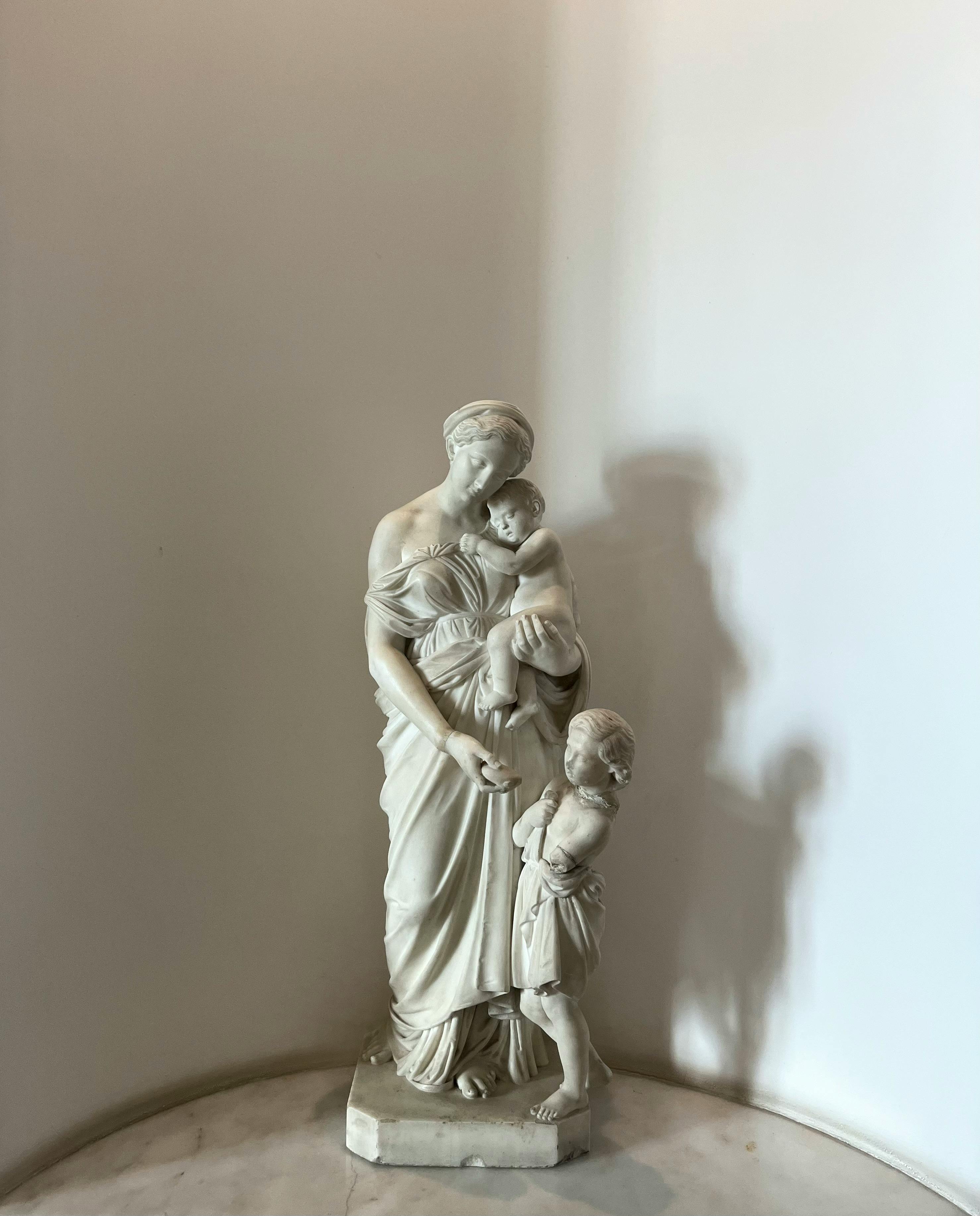 Statue of Mother with Children · Free Stock Photo