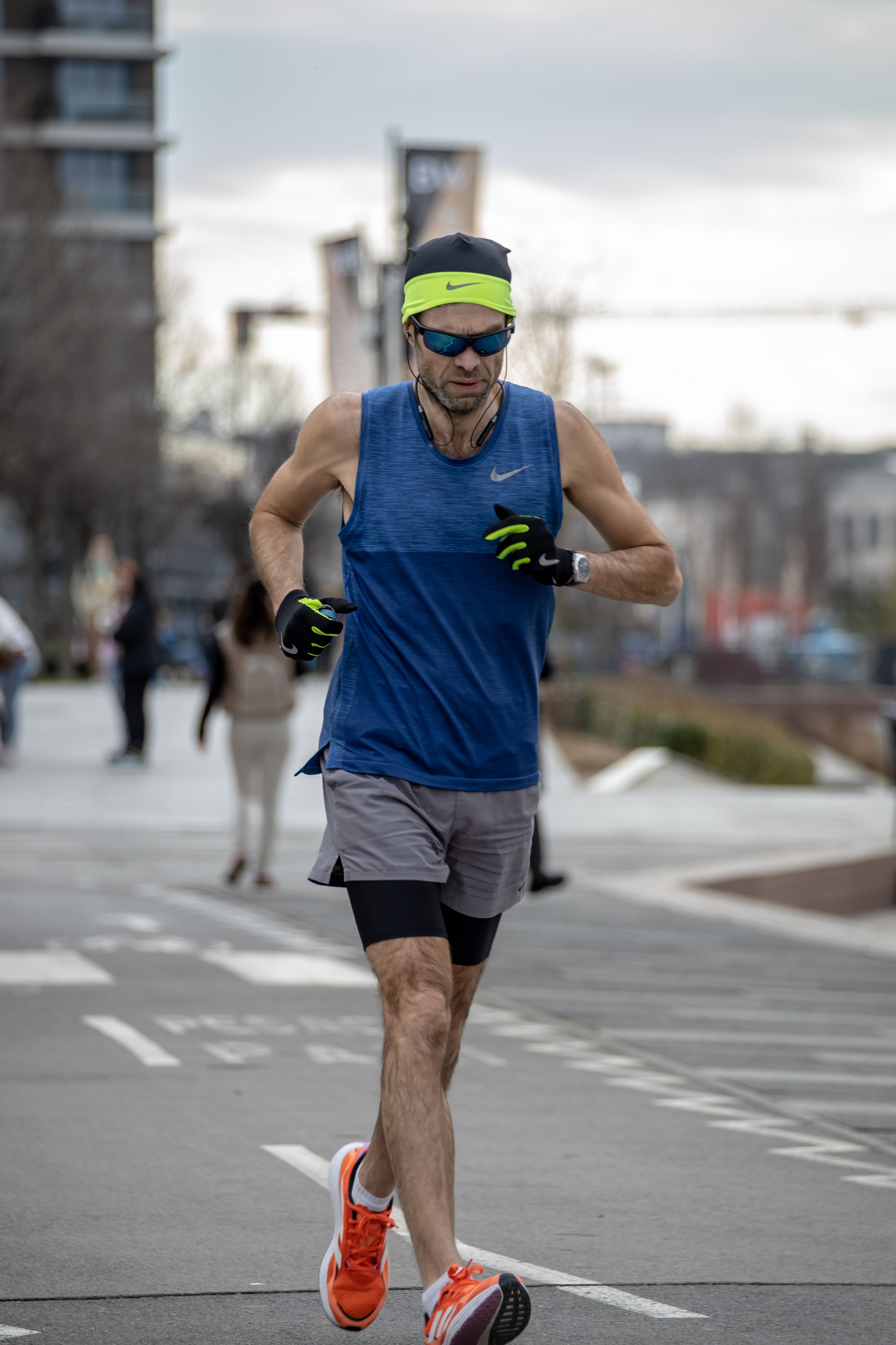 Man Running on Urban Street · Free Stock Photo