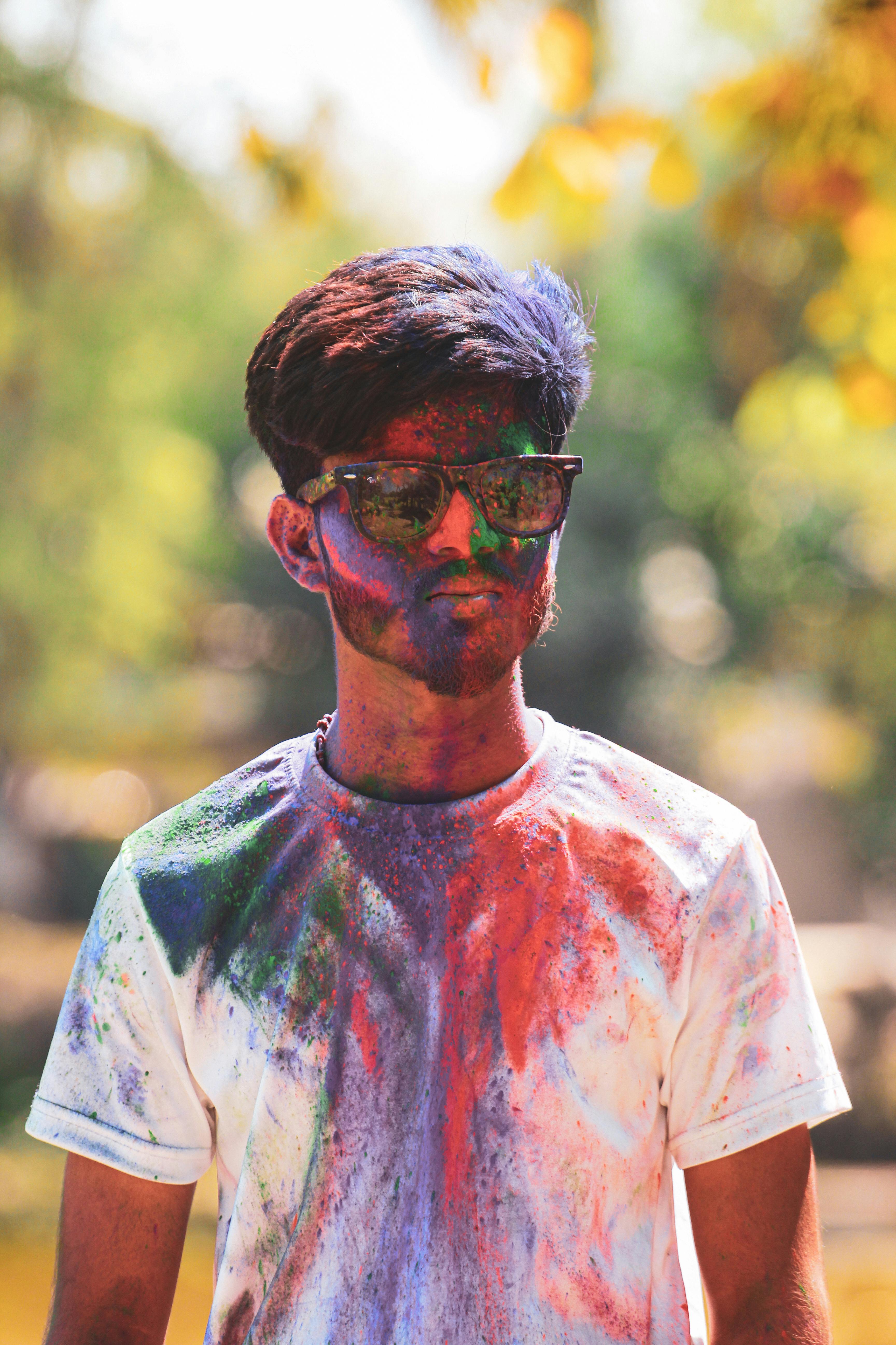 Woman in Bikini with Multi Colored Paints on Body · Free Stock Photo