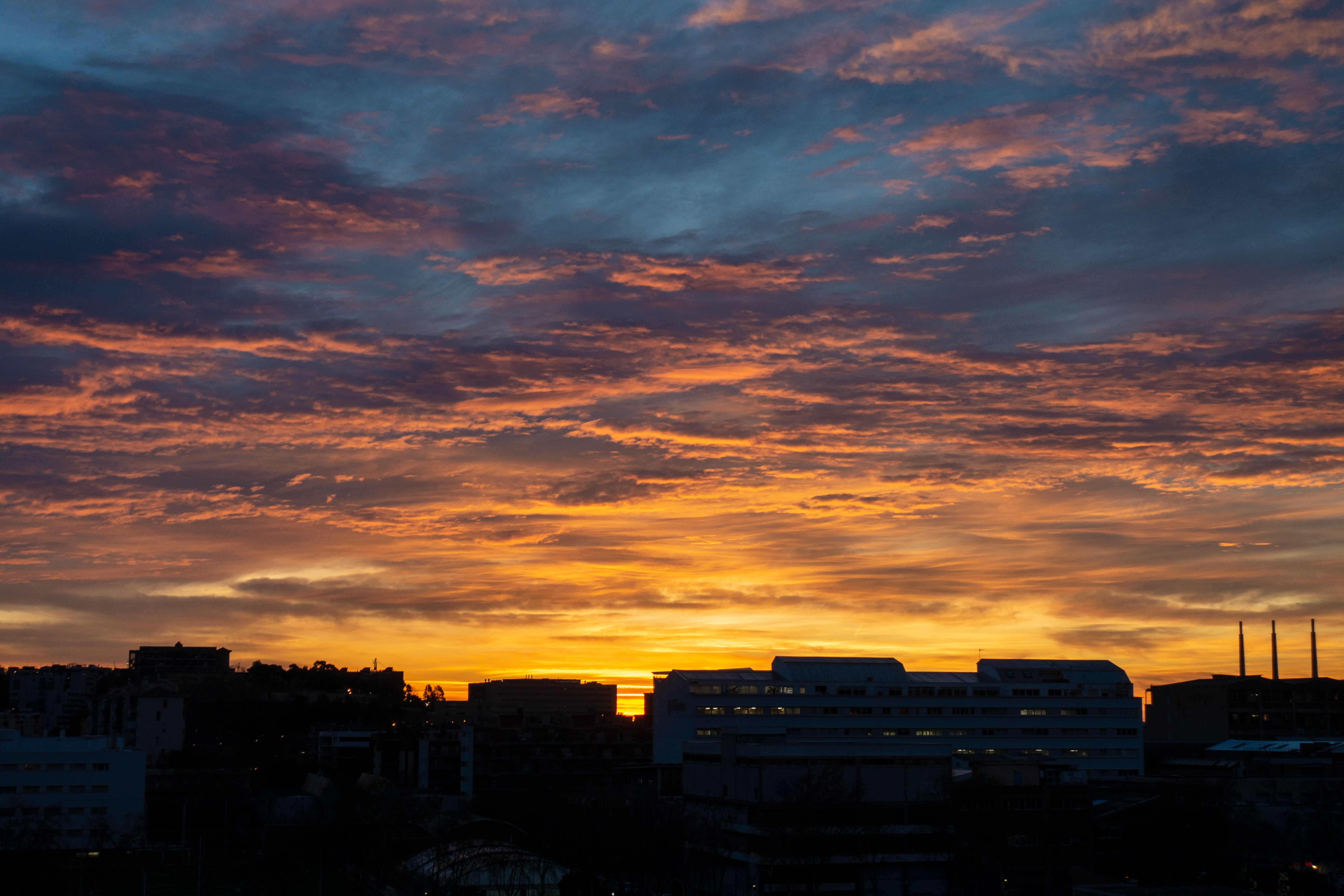 A Cloud Above Buildings · Free Stock Photo