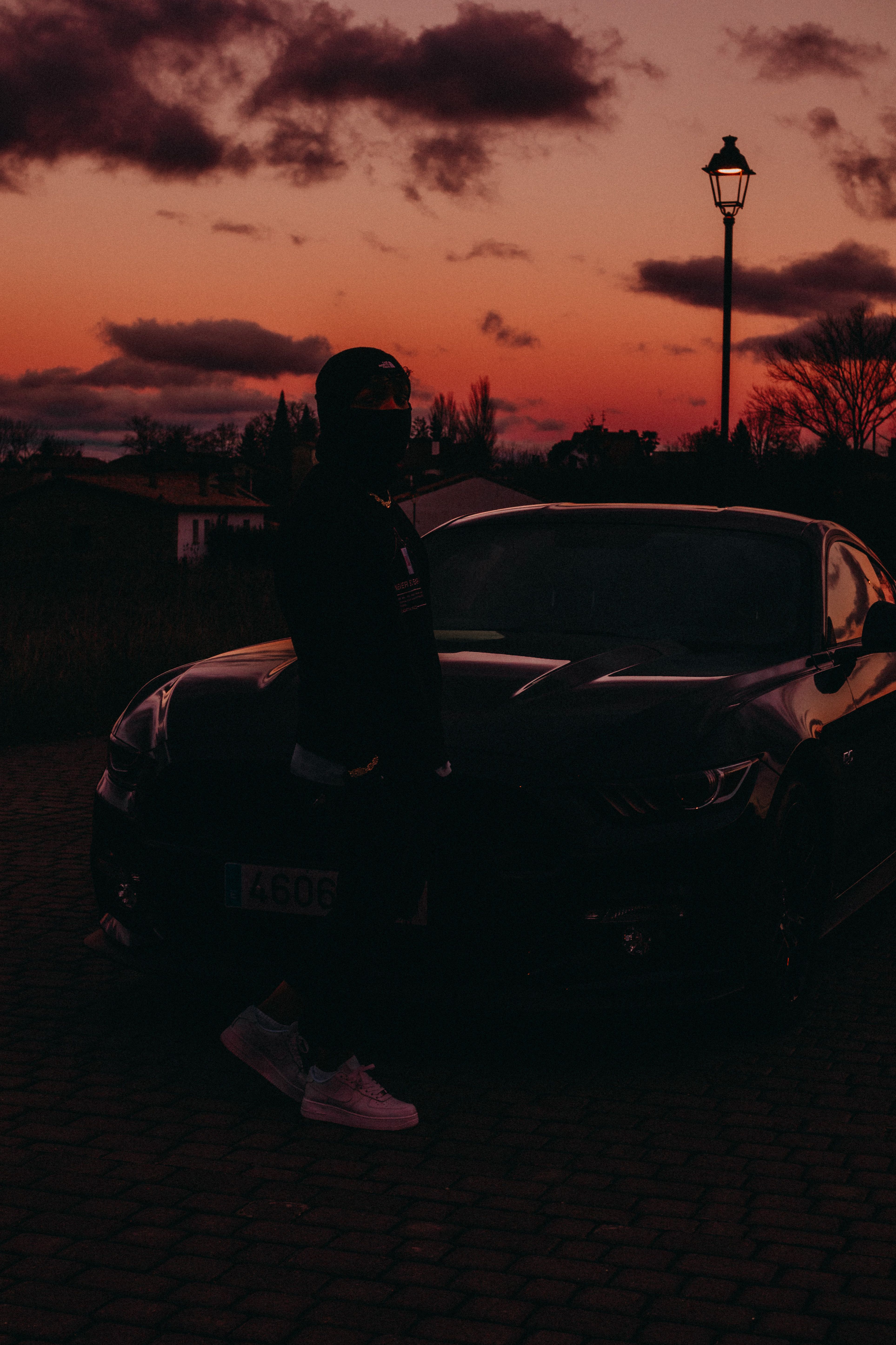 Man with Ford Mustang at Dusk · Free Stock Photo