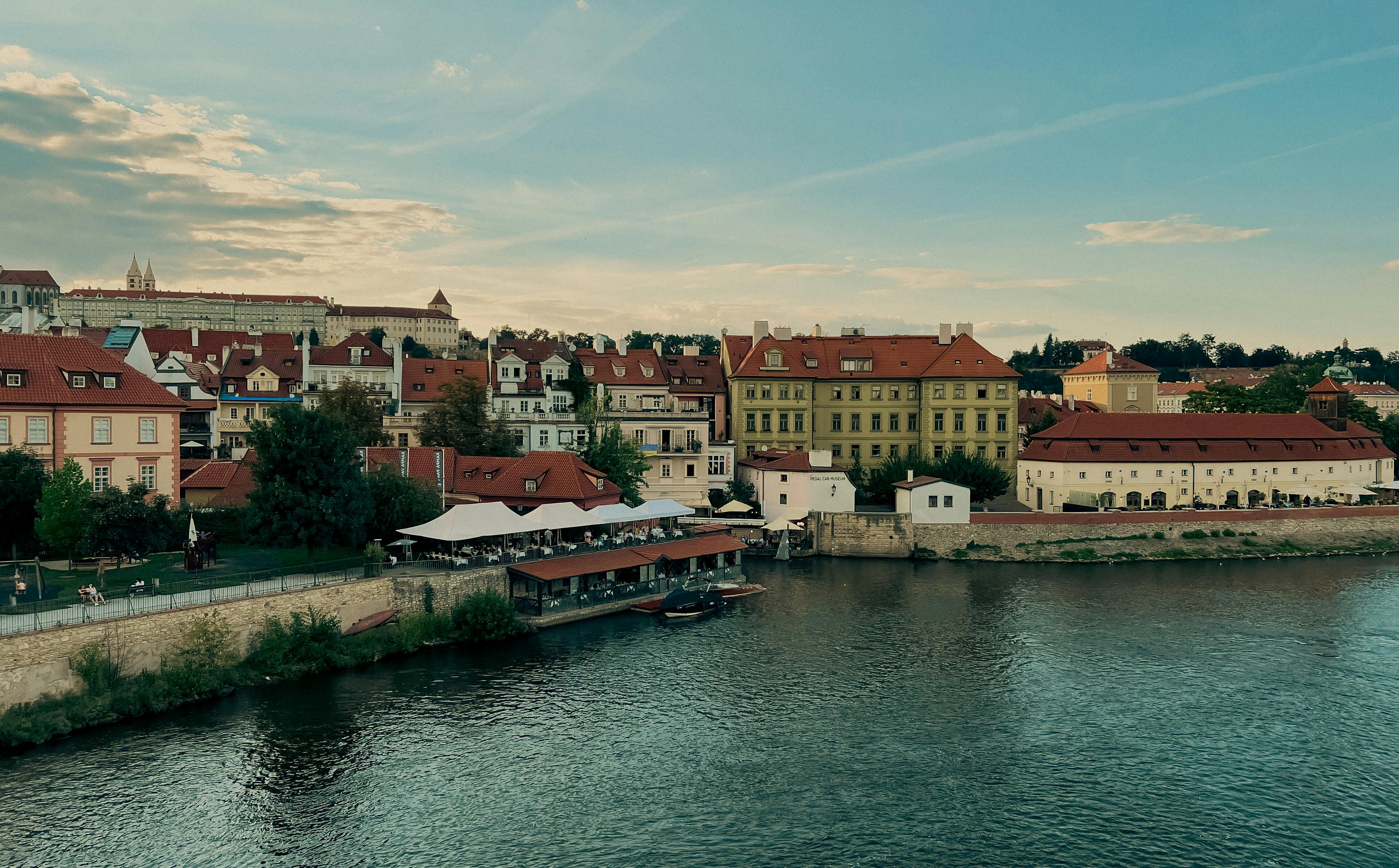 Buildings by River in Prague · Free Stock Photo