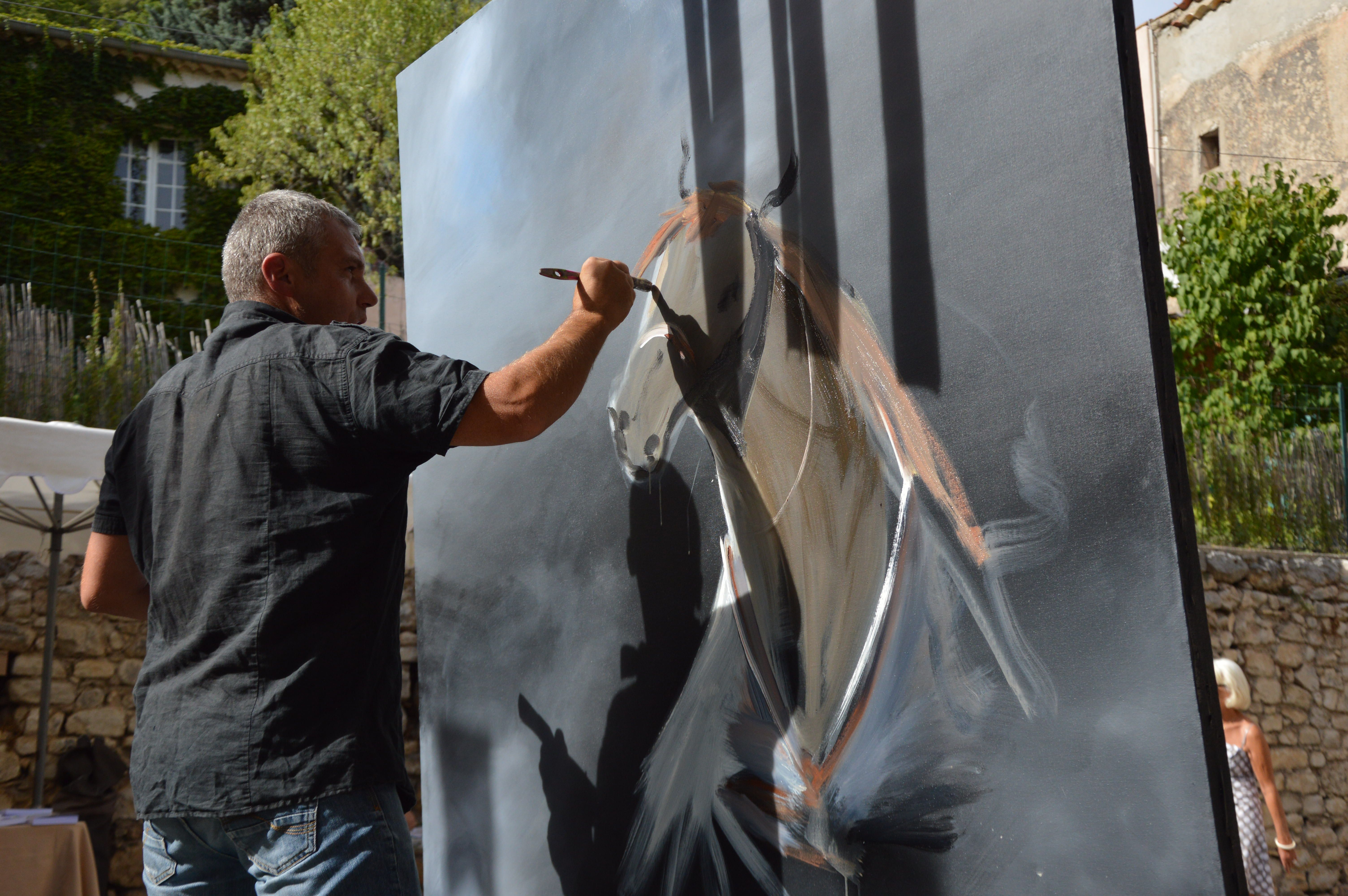 Man Drawing in Canvas Outdoors · Free Stock Photo