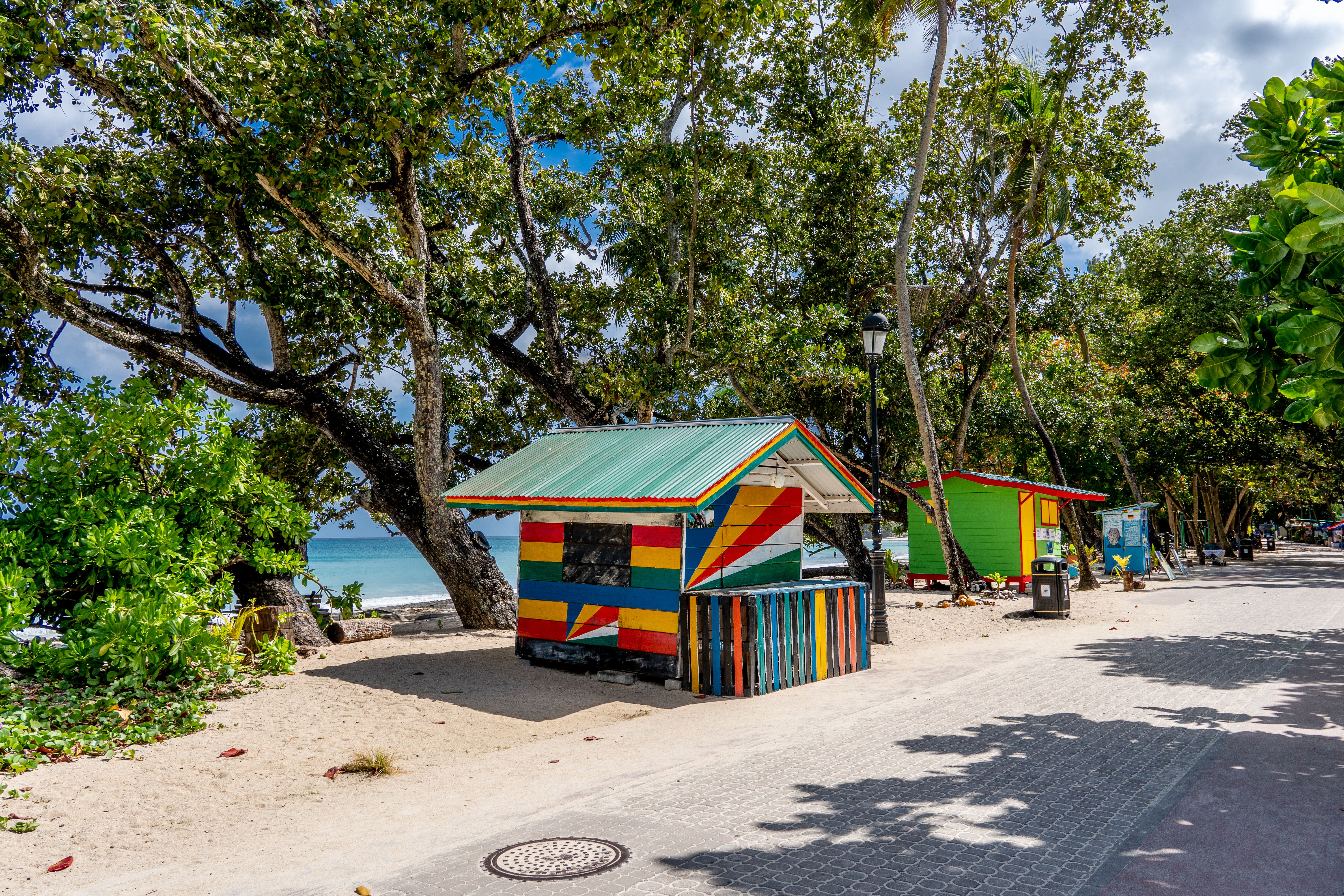 Alley with Colorful Sheds on Shore · Free Stock Photo