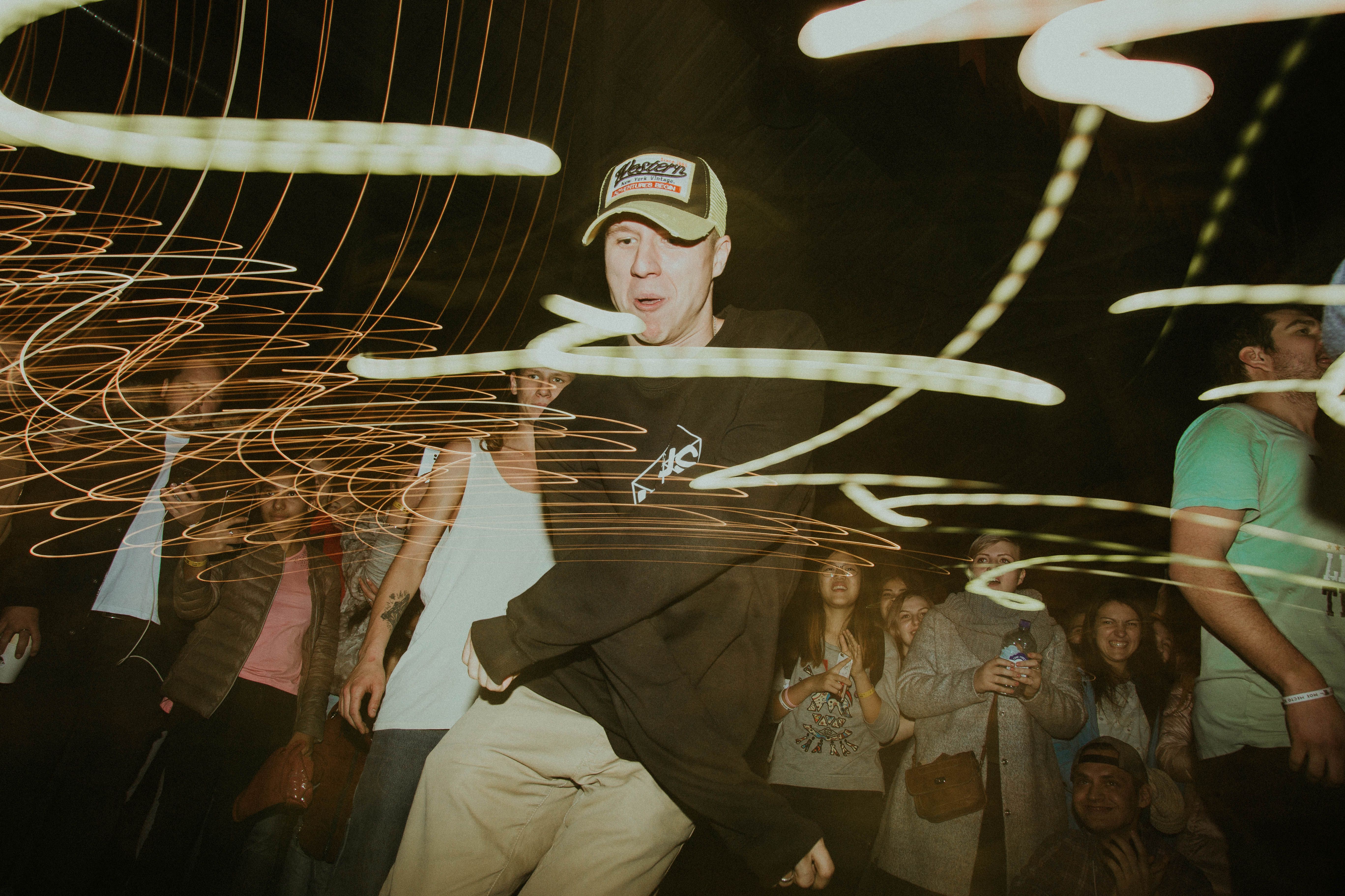 Lights around Man Dancing in Club · Free Stock Photo