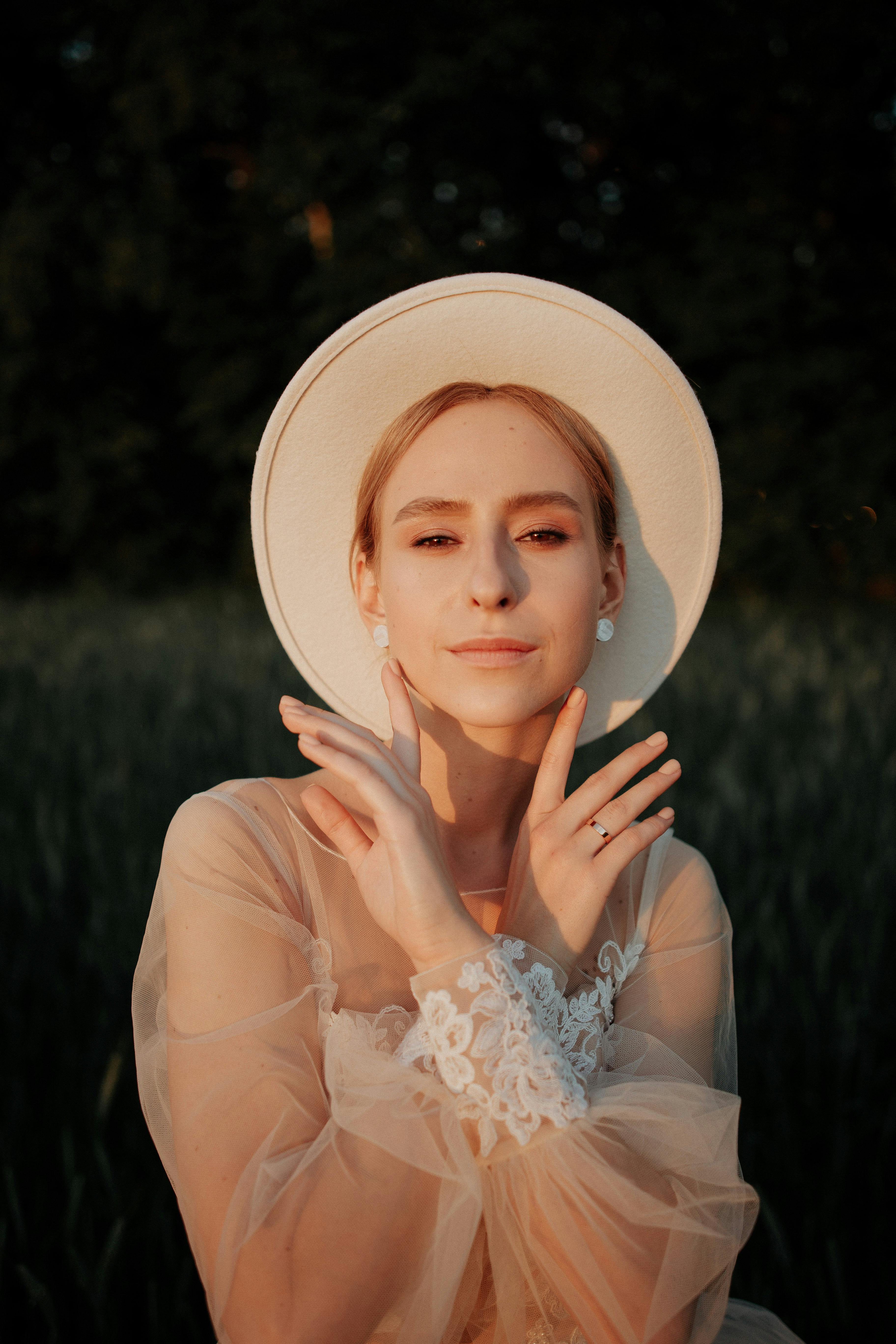 Woman Posing in Hat · Free Stock Photo