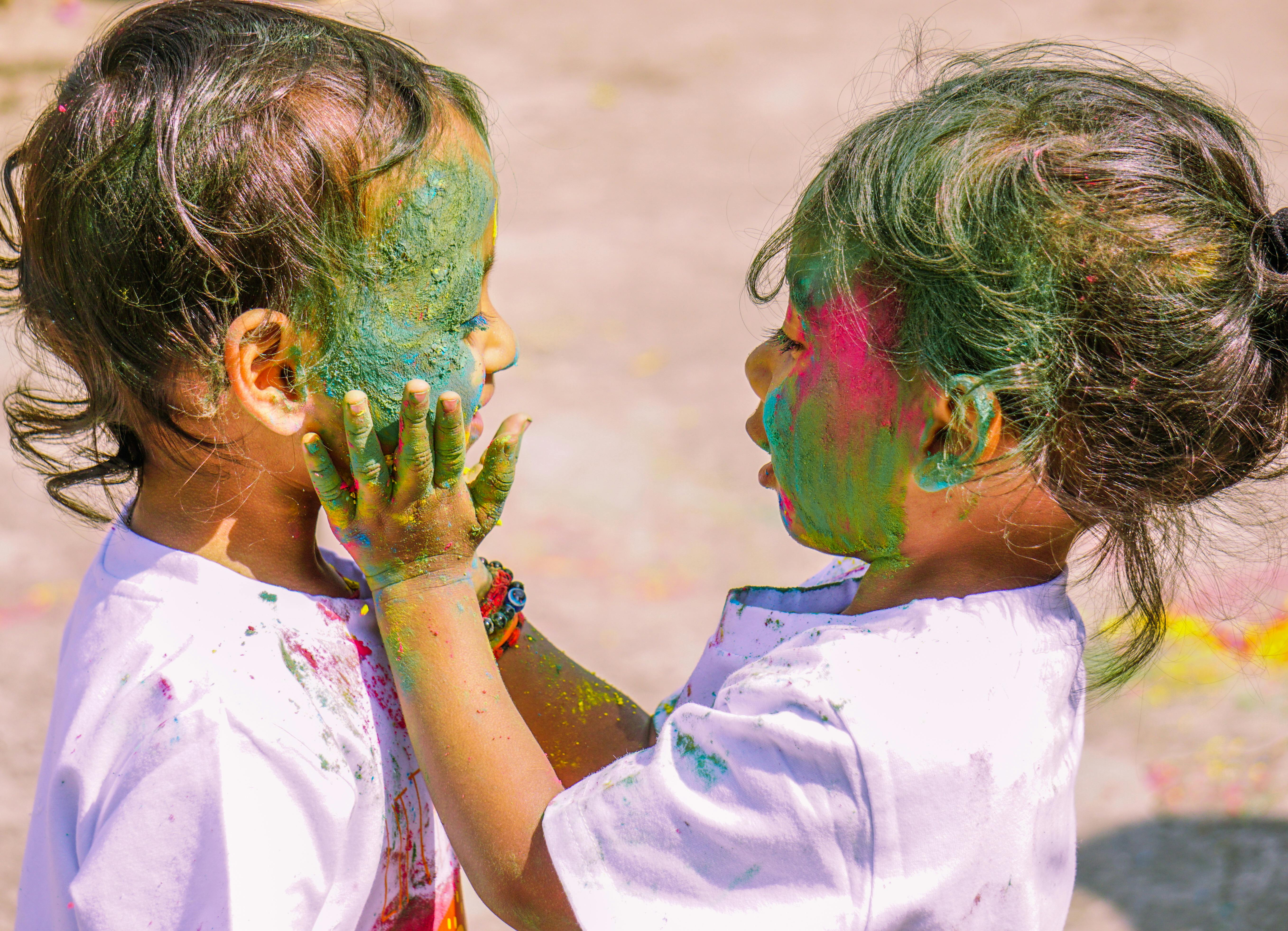Colorful Powder on Girls · Free Stock Photo
