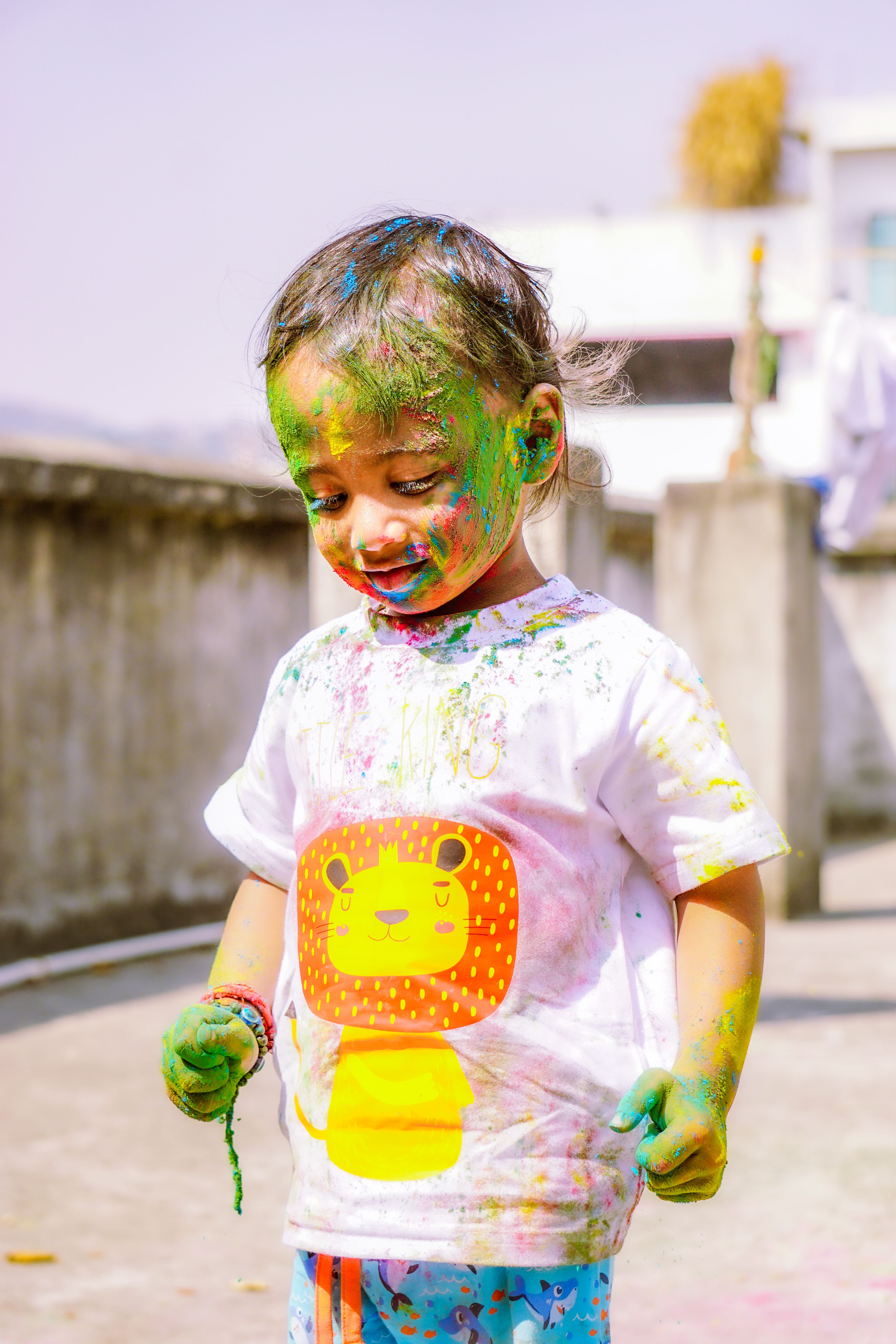 Colorful Powder on Boy in T-shirt · Free Stock Photo