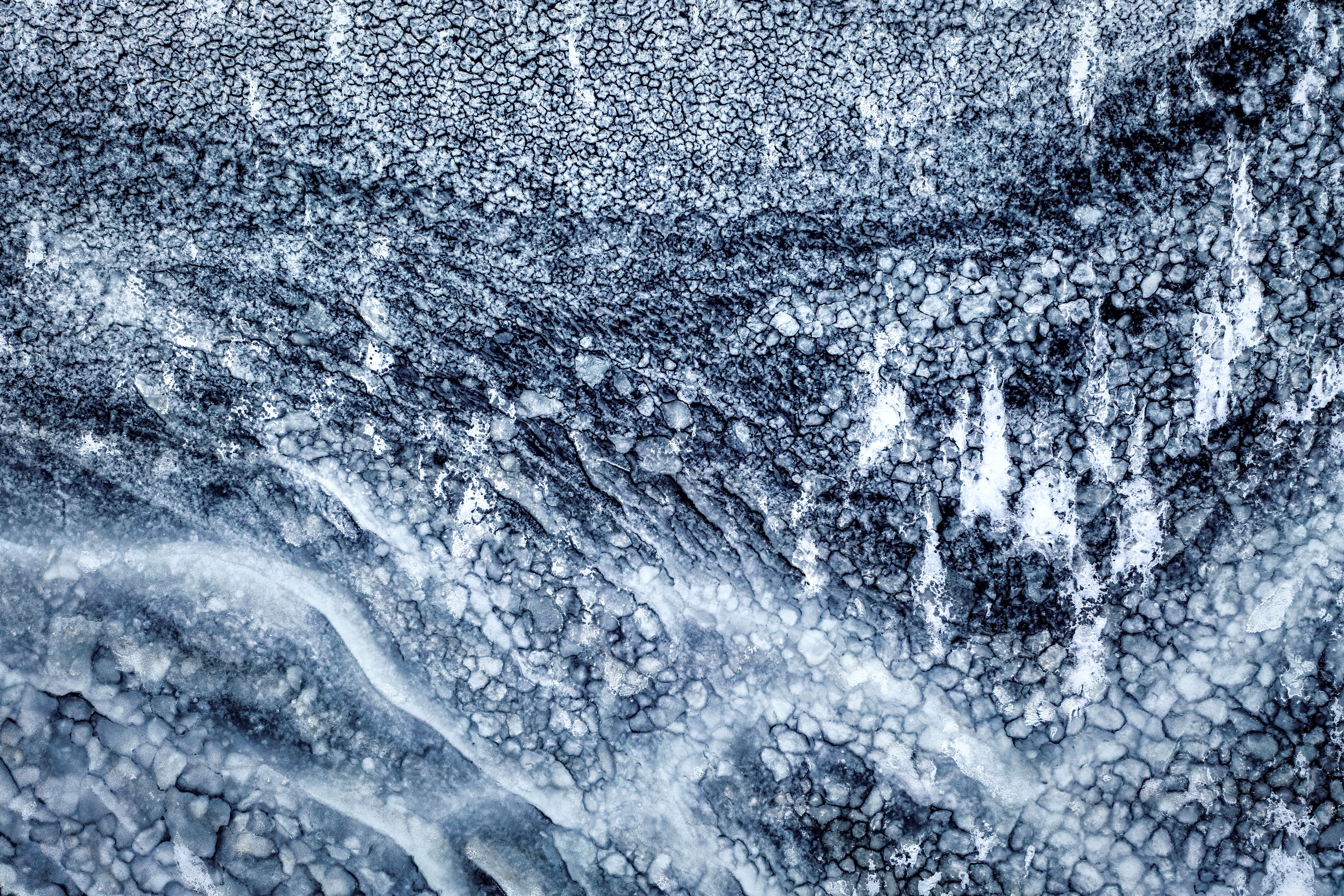 Close-up on Ice Crystals Forming on Rock · Free Stock Photo