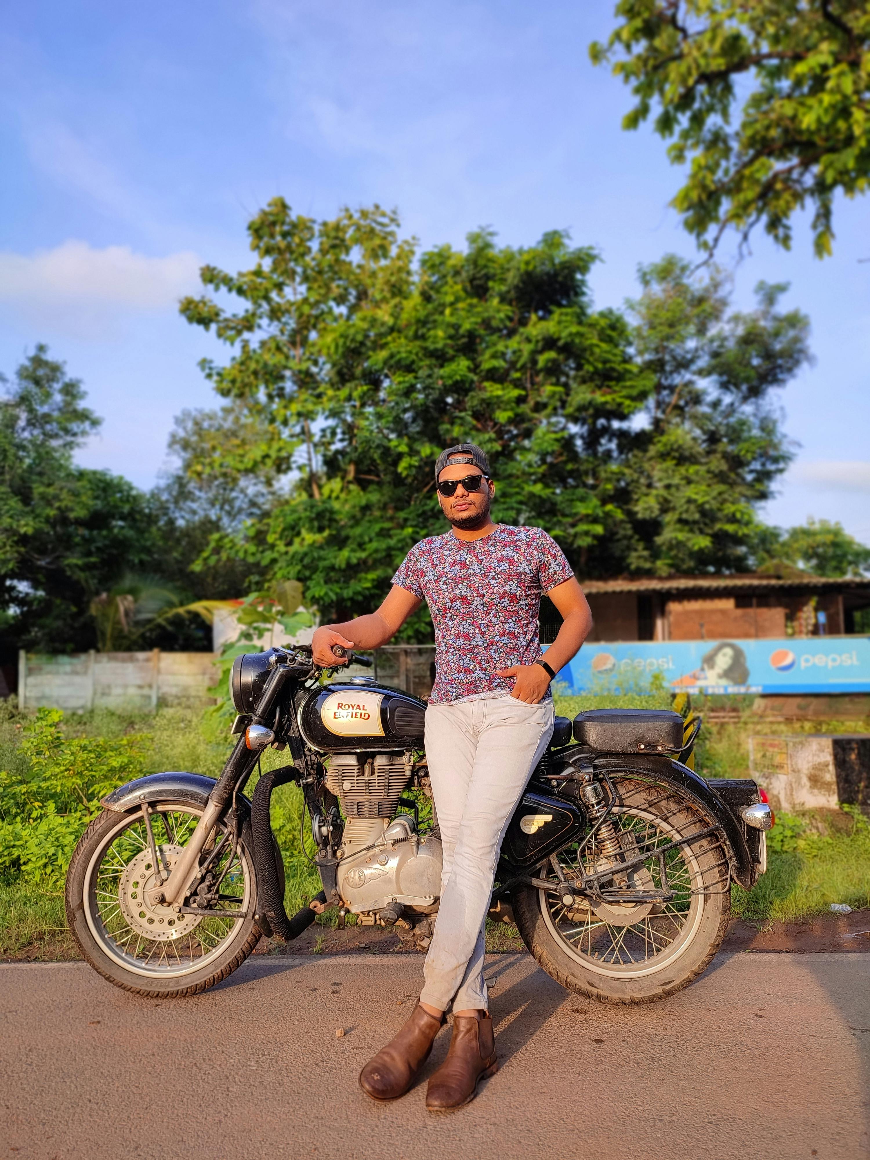 Man Leaning on Motorcycle · Free Stock Photo