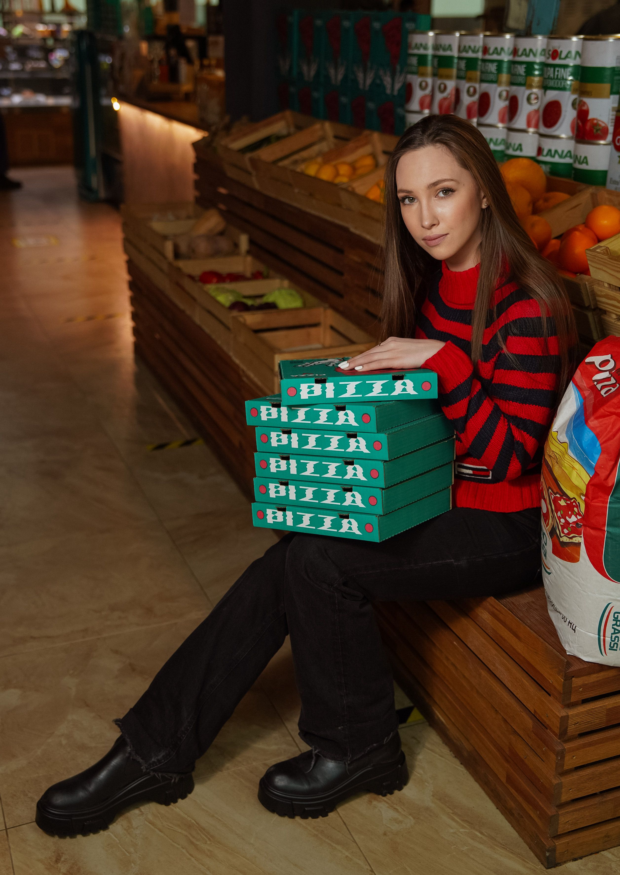 Woman Posing with Pizza Boxes · Free Stock Photo