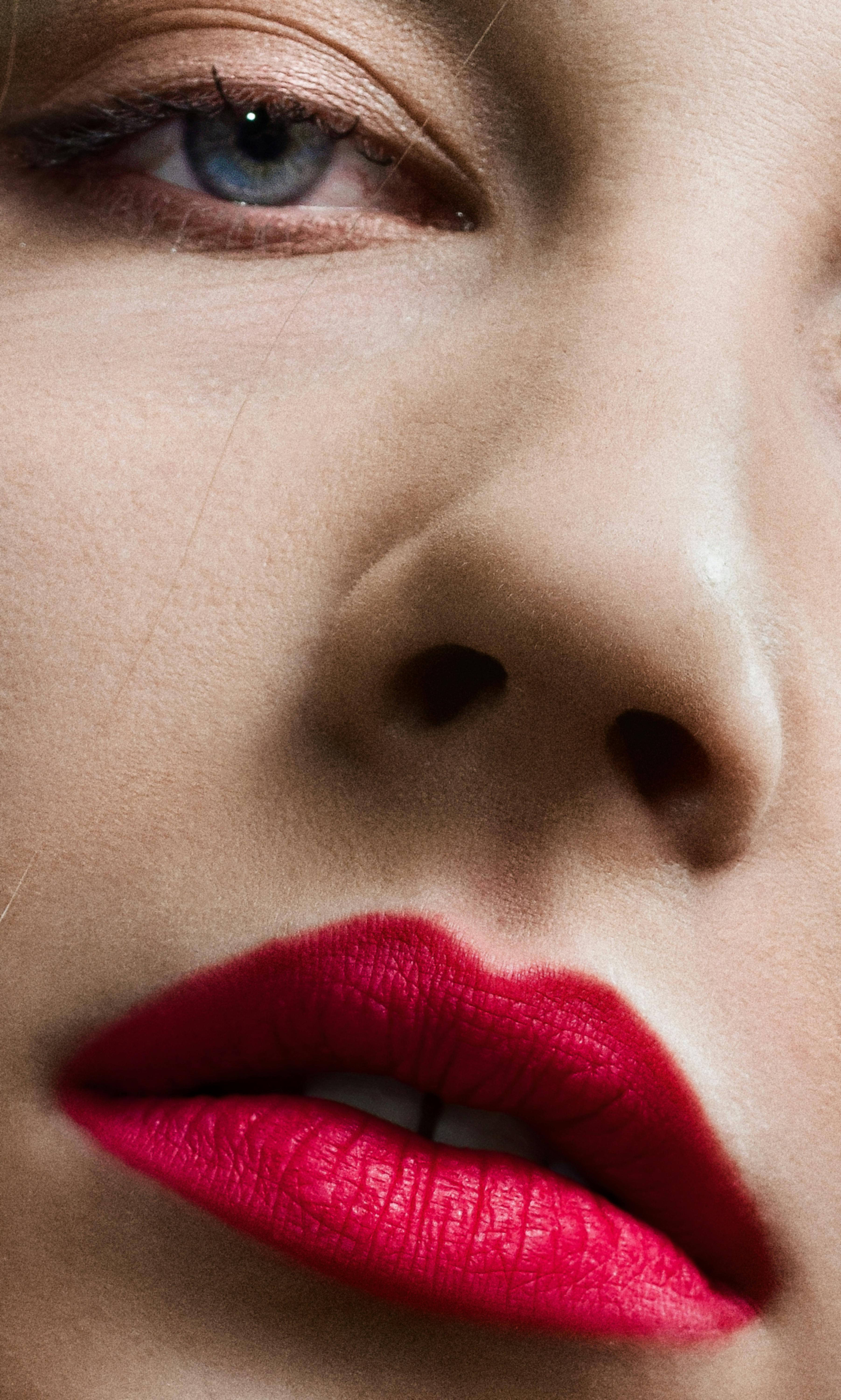 Close-up of the Face of a Woman Wearing Pink Lipstick · Free Stock Photo