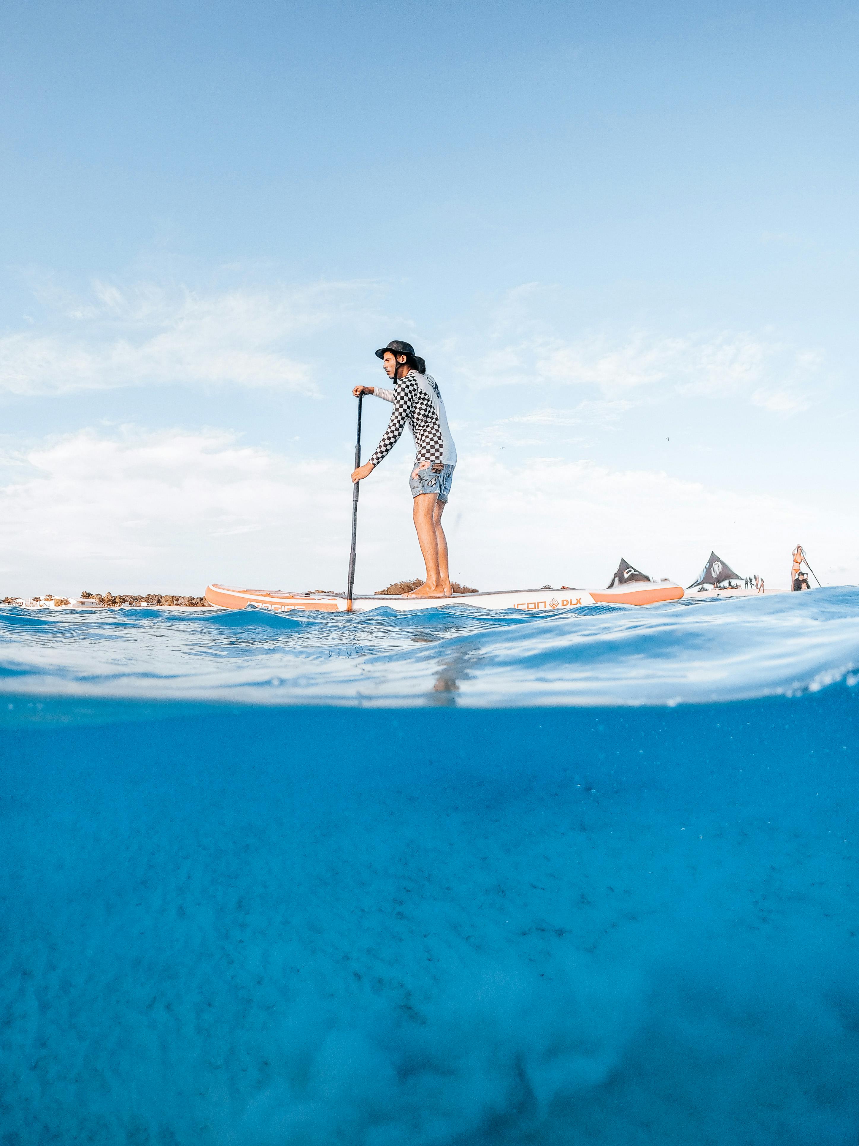 A Woman on a Paddleboard · Free Stock Photo
