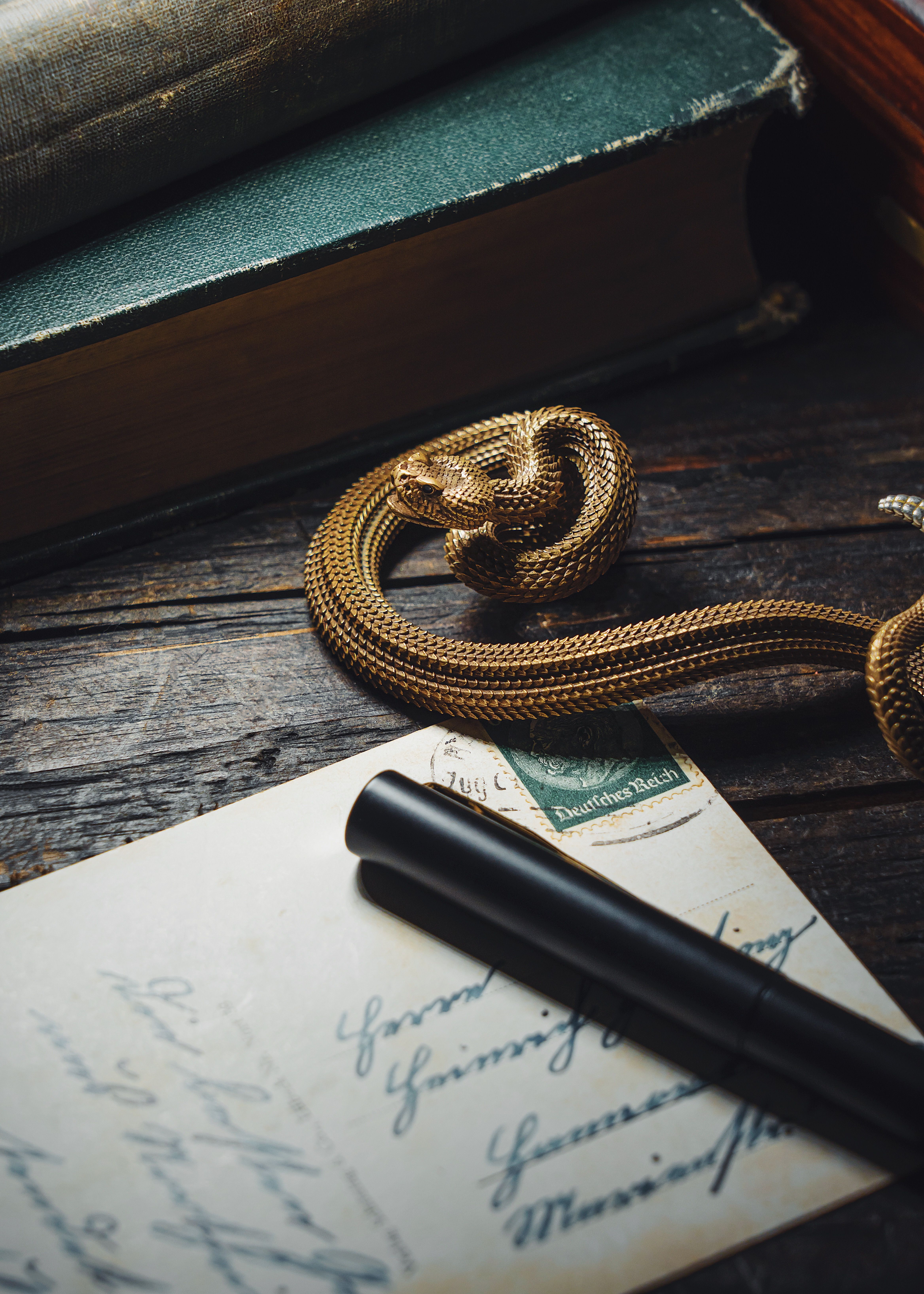 Envelope and Bronze Snake · Free Stock Photo