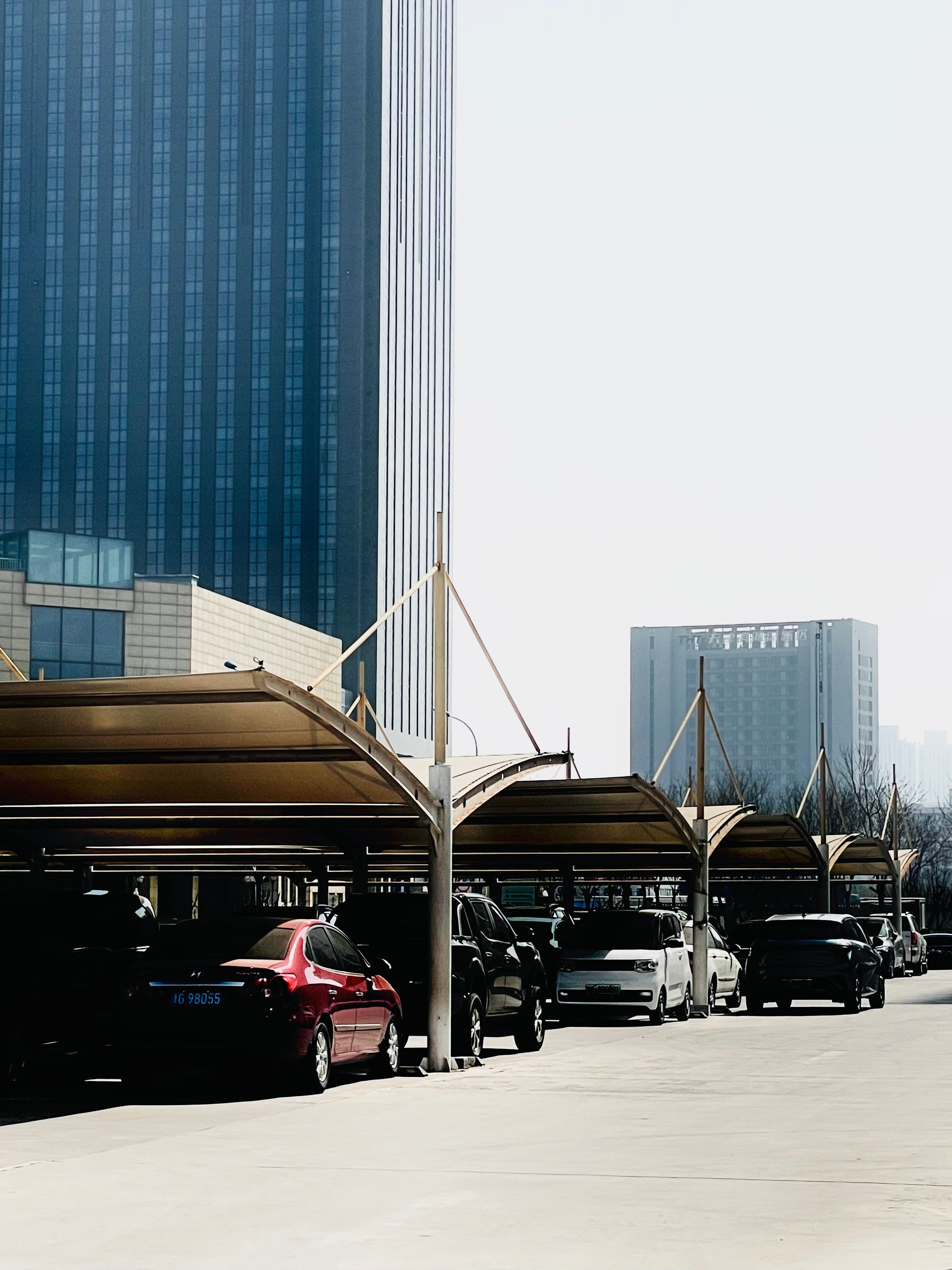 Cars on Covered Parking Lot · Free Stock Photo