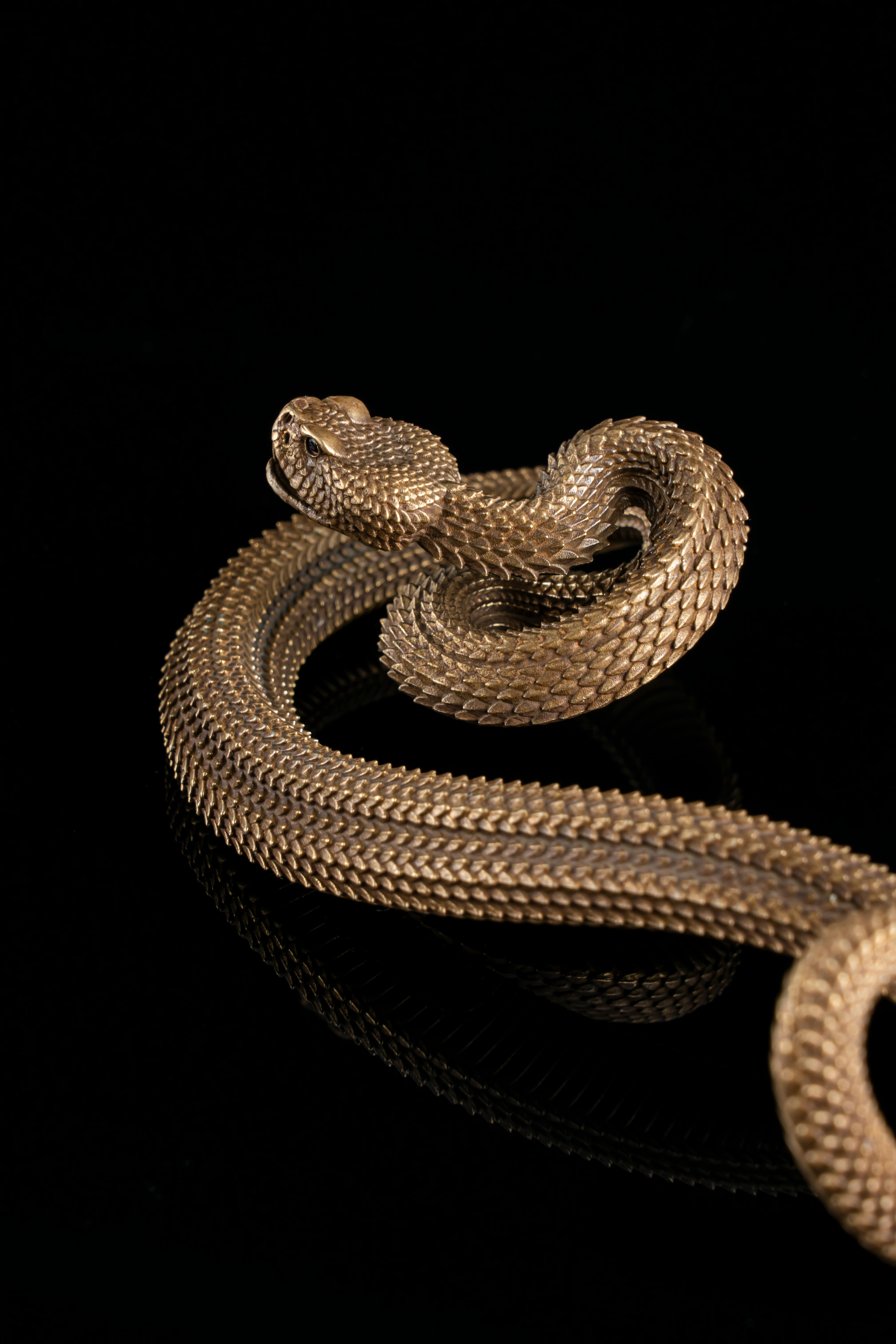 Snake Figurine Close Up · Free Stock Photo