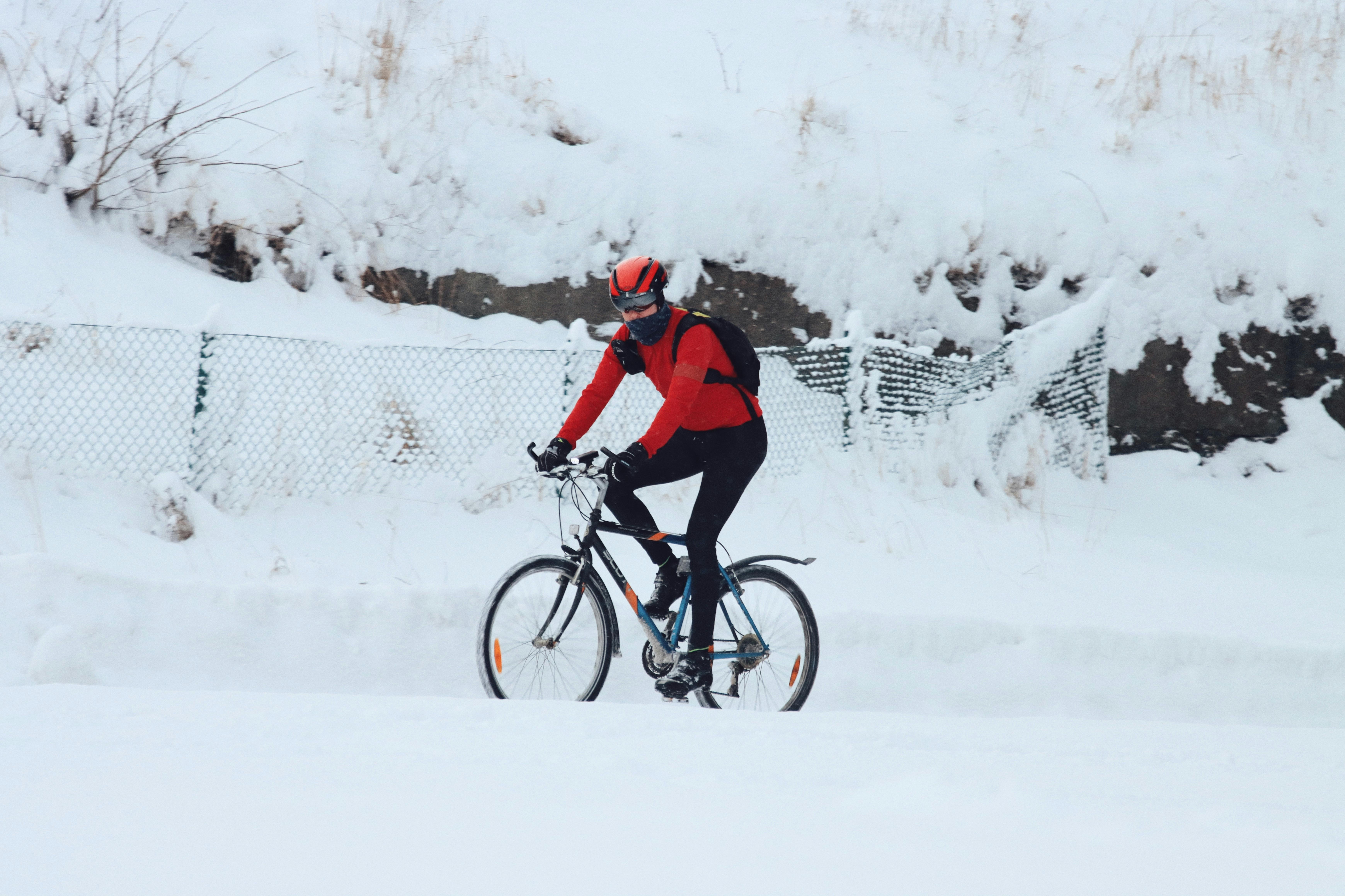 Man Riding on Bike on Snow · Free Stock Photo