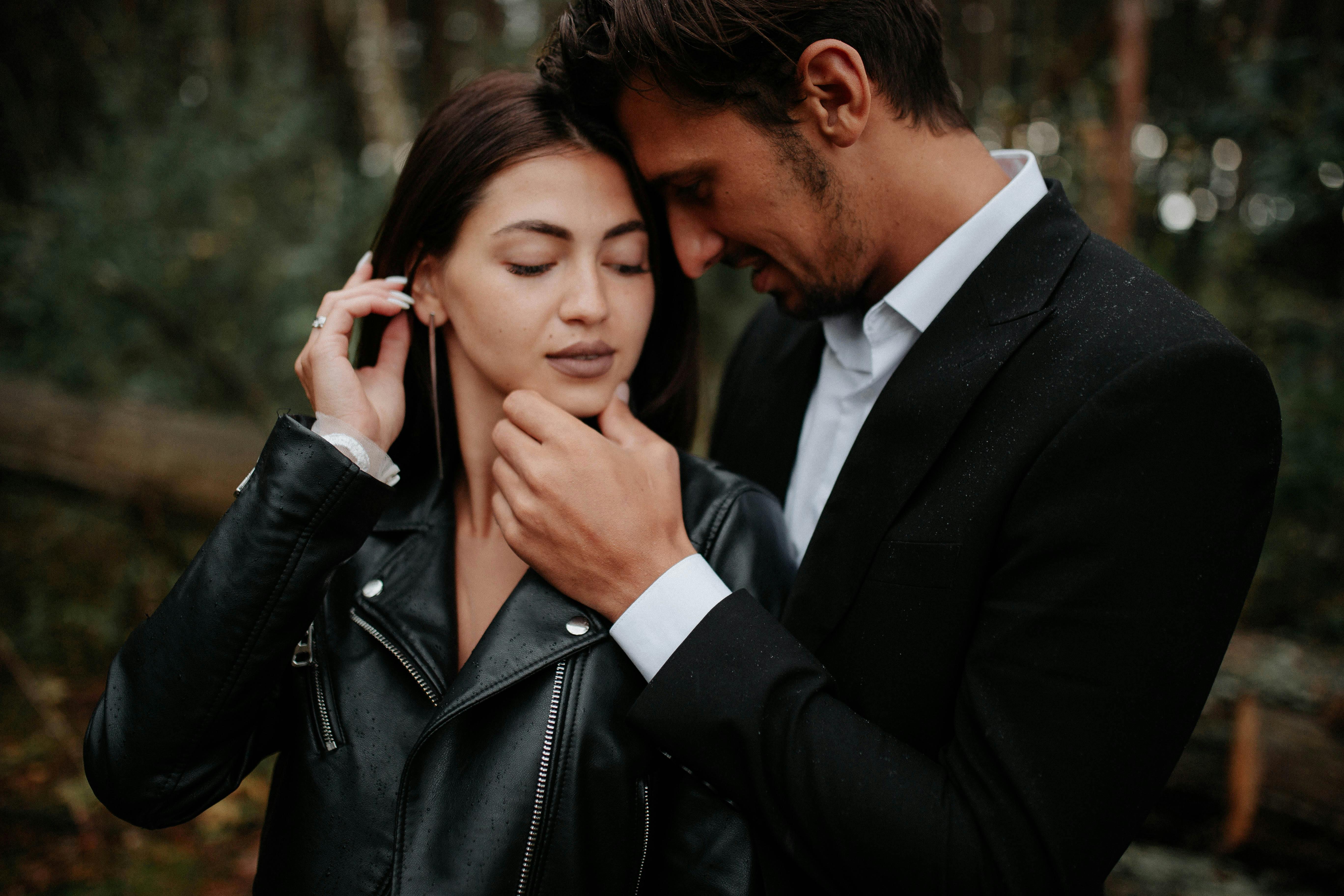 Man and Woman Standing on Field · Free Stock Photo