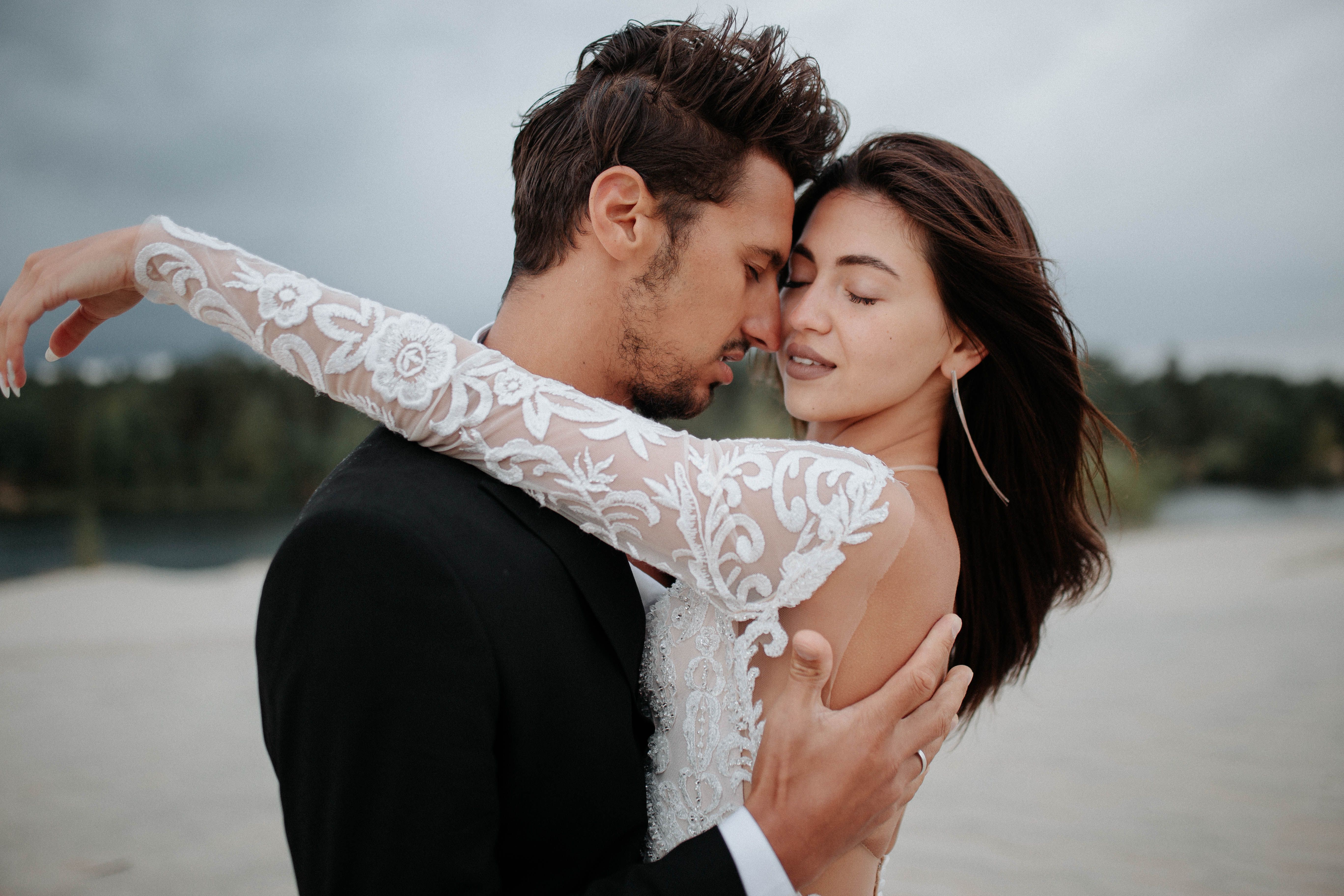 Woman Touching Mans Cheek · Free Stock Photo