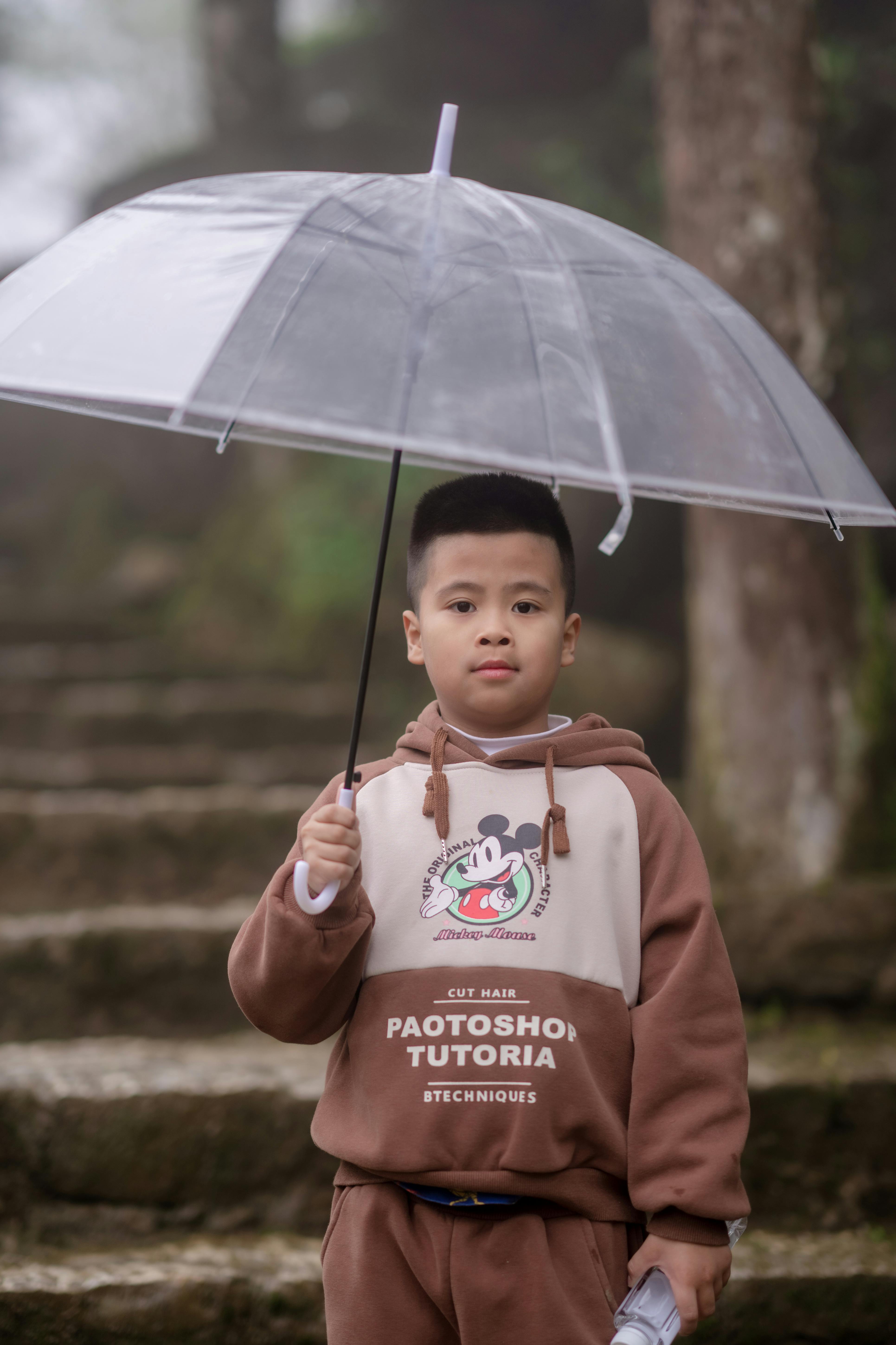 Boy with Umbrella · Free Stock Photo