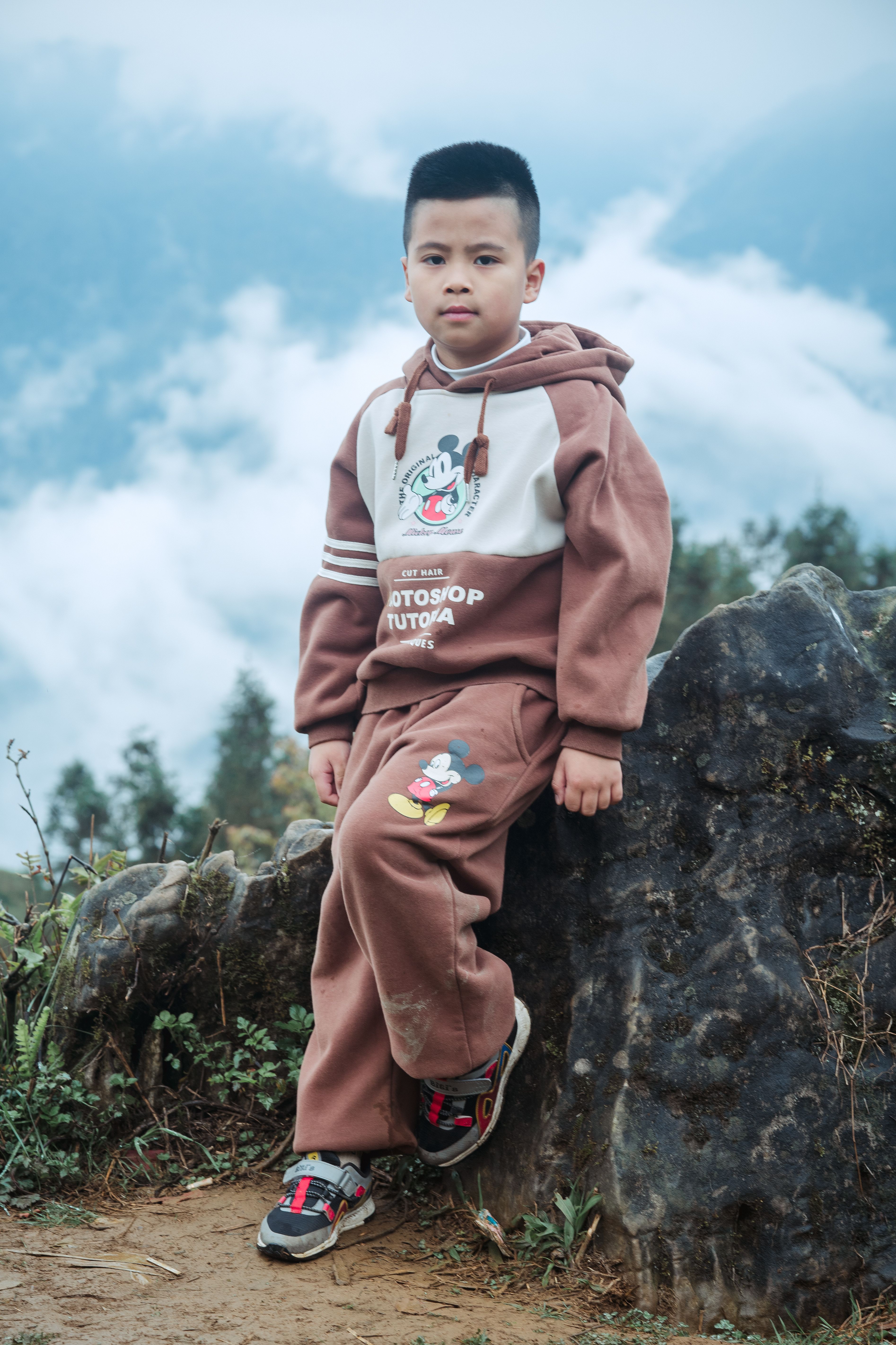 Portrait of a Boy with Closed Eyes against Clouded Sky · Free Stock Photo