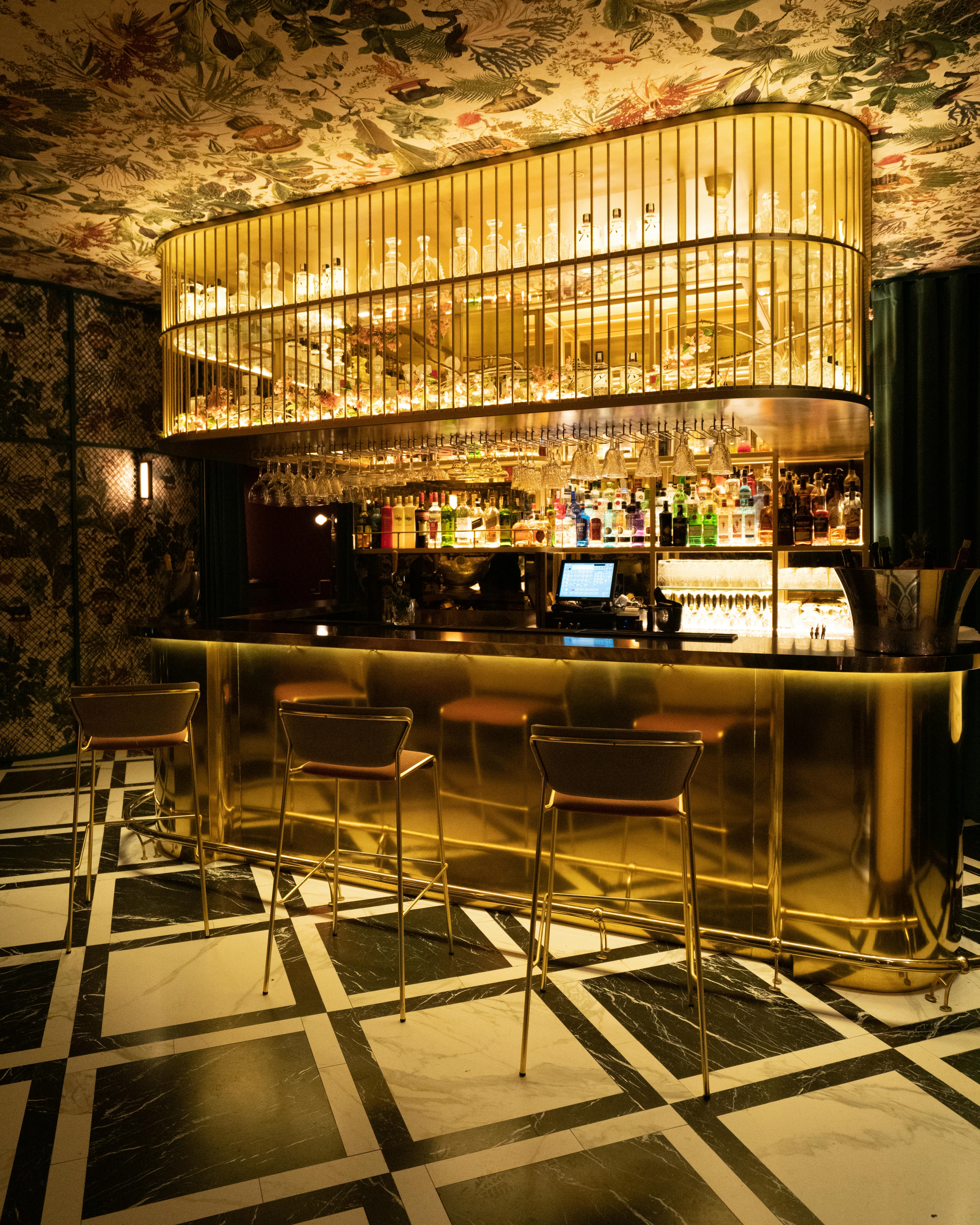 Nightclub Interior with Illuminated Glass Structure over the Metal Bar ...