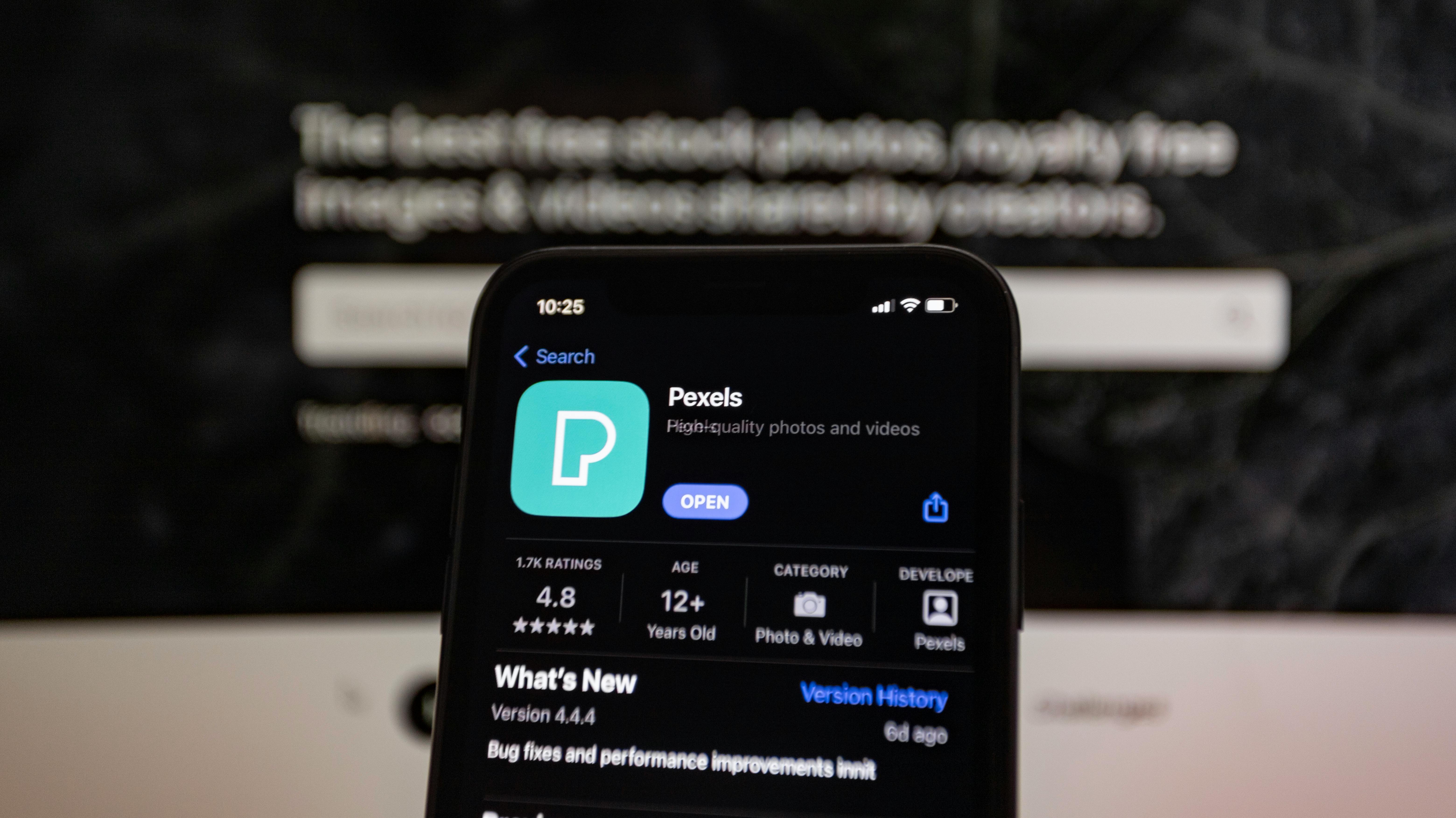 Close-up of a Smartphone Screen Displaying a Pexels App in Apple Store ...