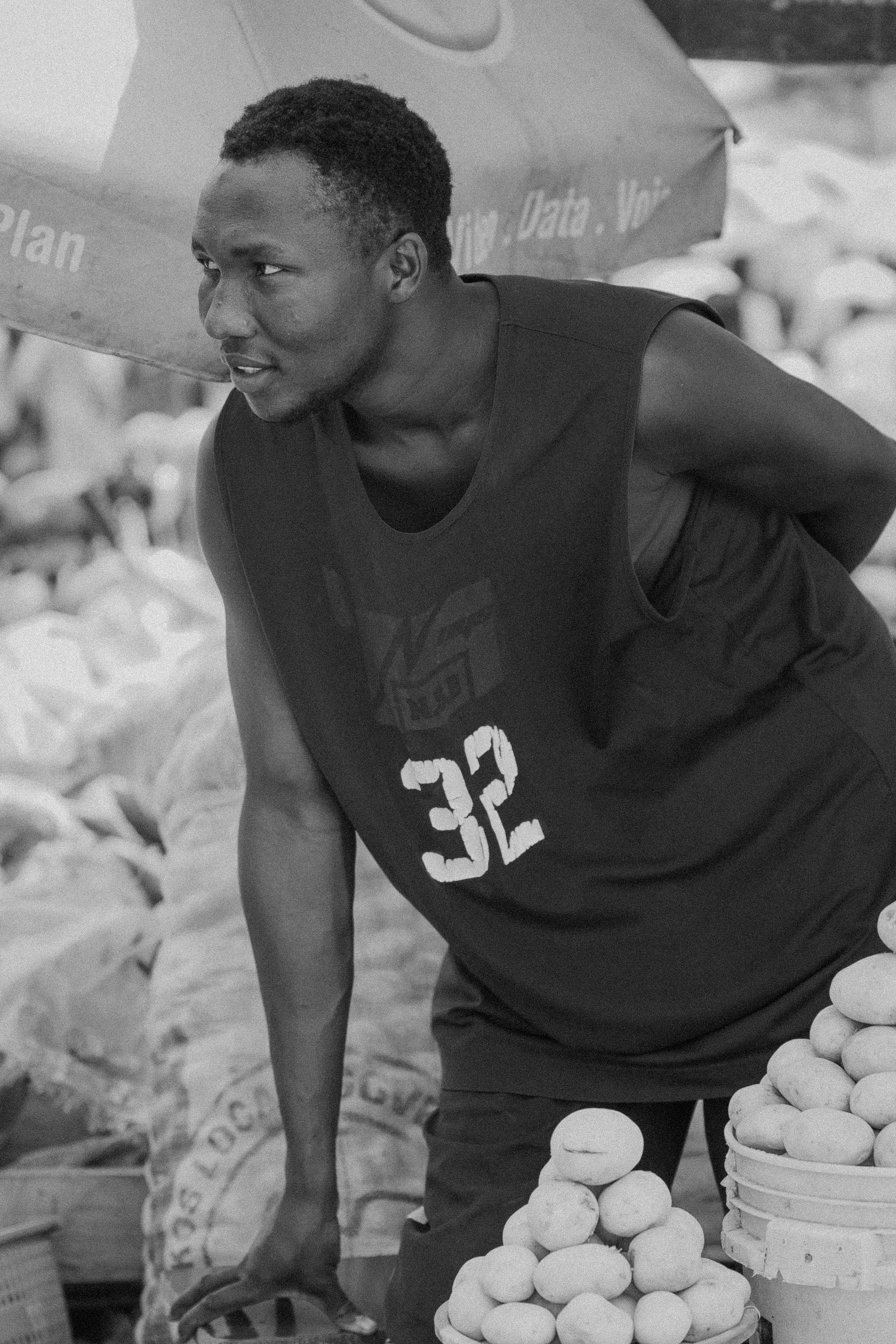 Black Man Selling on Street Market · Free Stock Photo