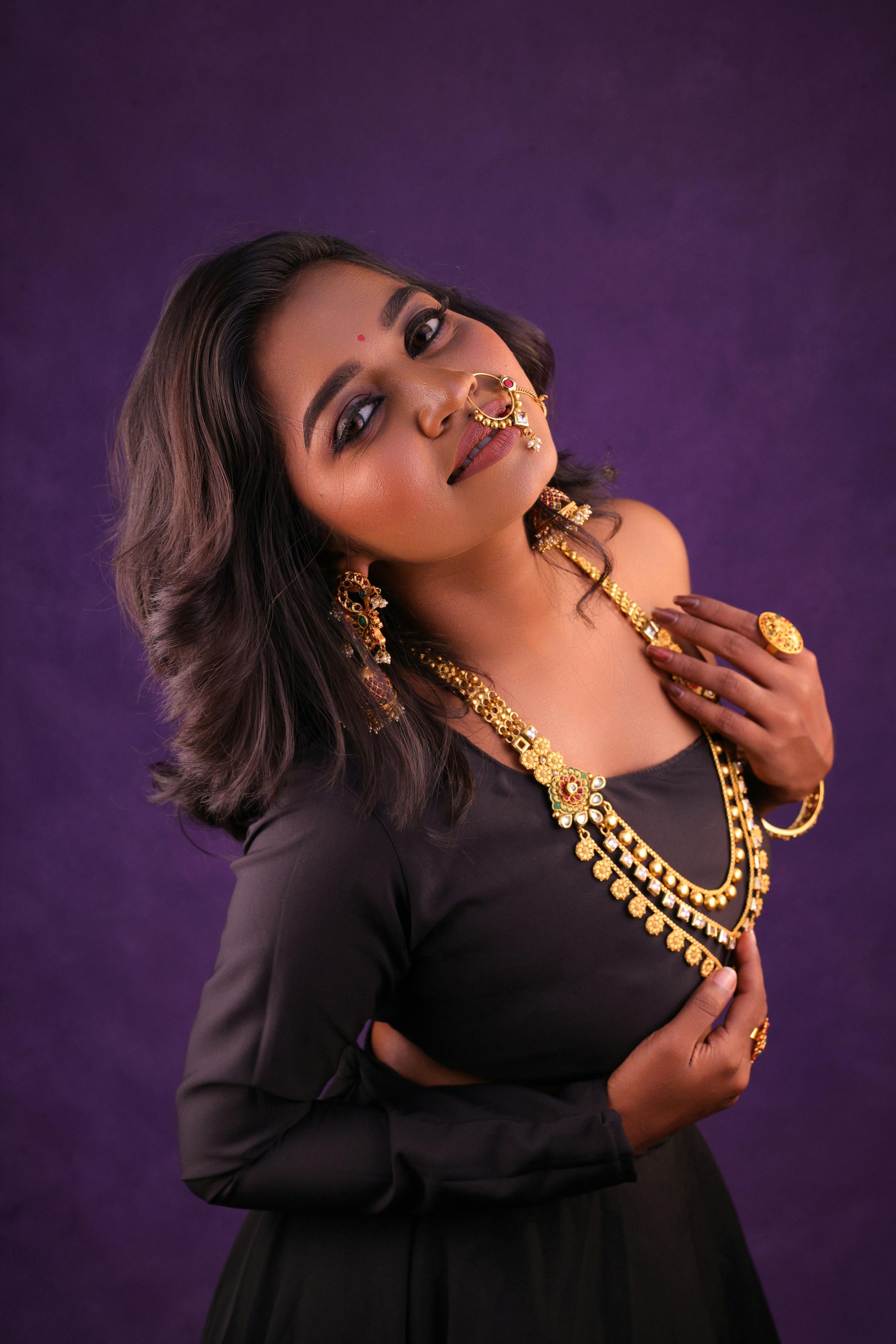 Man and Woman Posing in Caps · Free Stock Photo