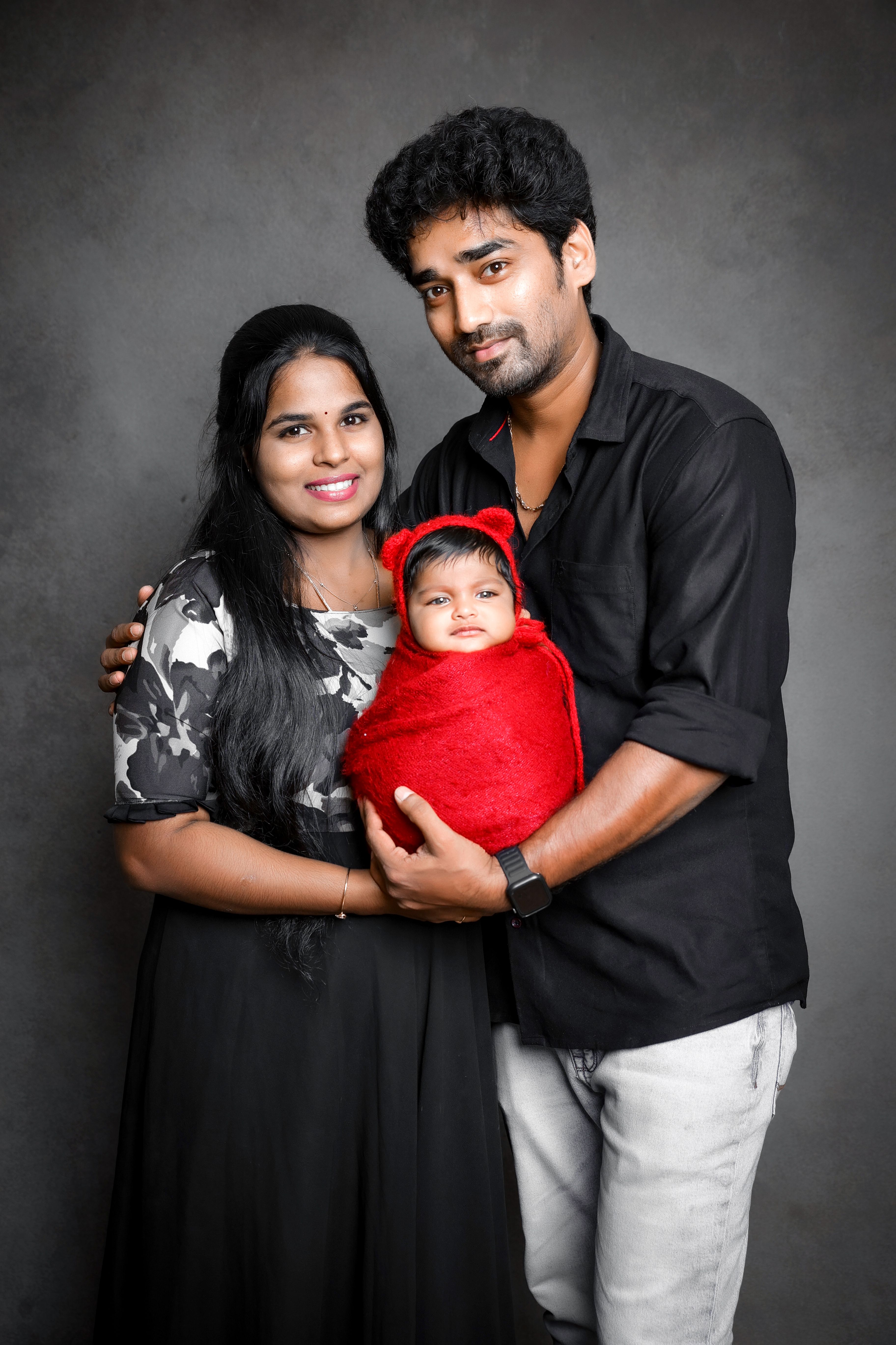 A Man Carrying a Baby · Free Stock Photo
