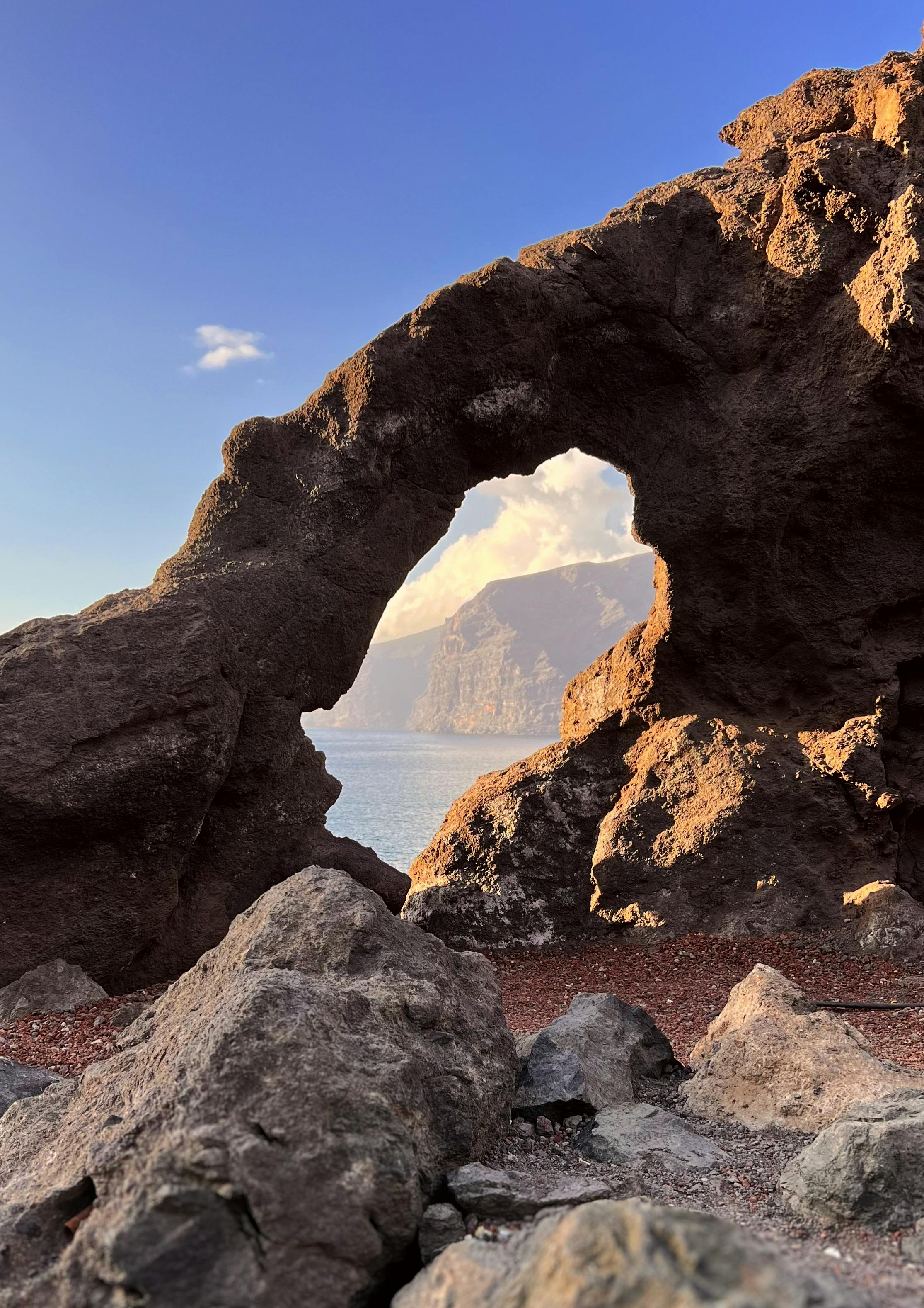 Rocks Forming Arch on Beach · Free Stock Photo