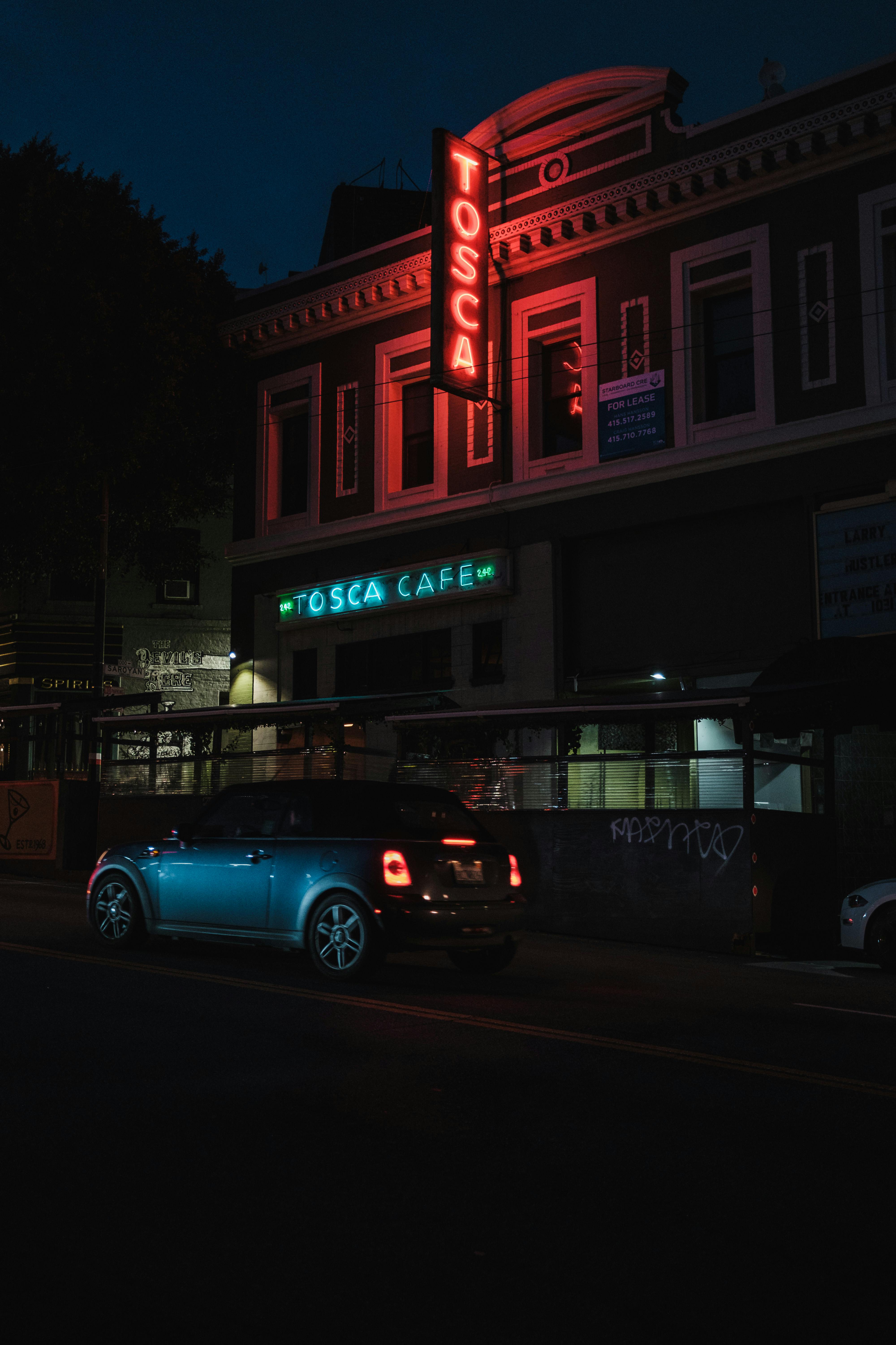 Car near Cafe at Night · Free Stock Photo