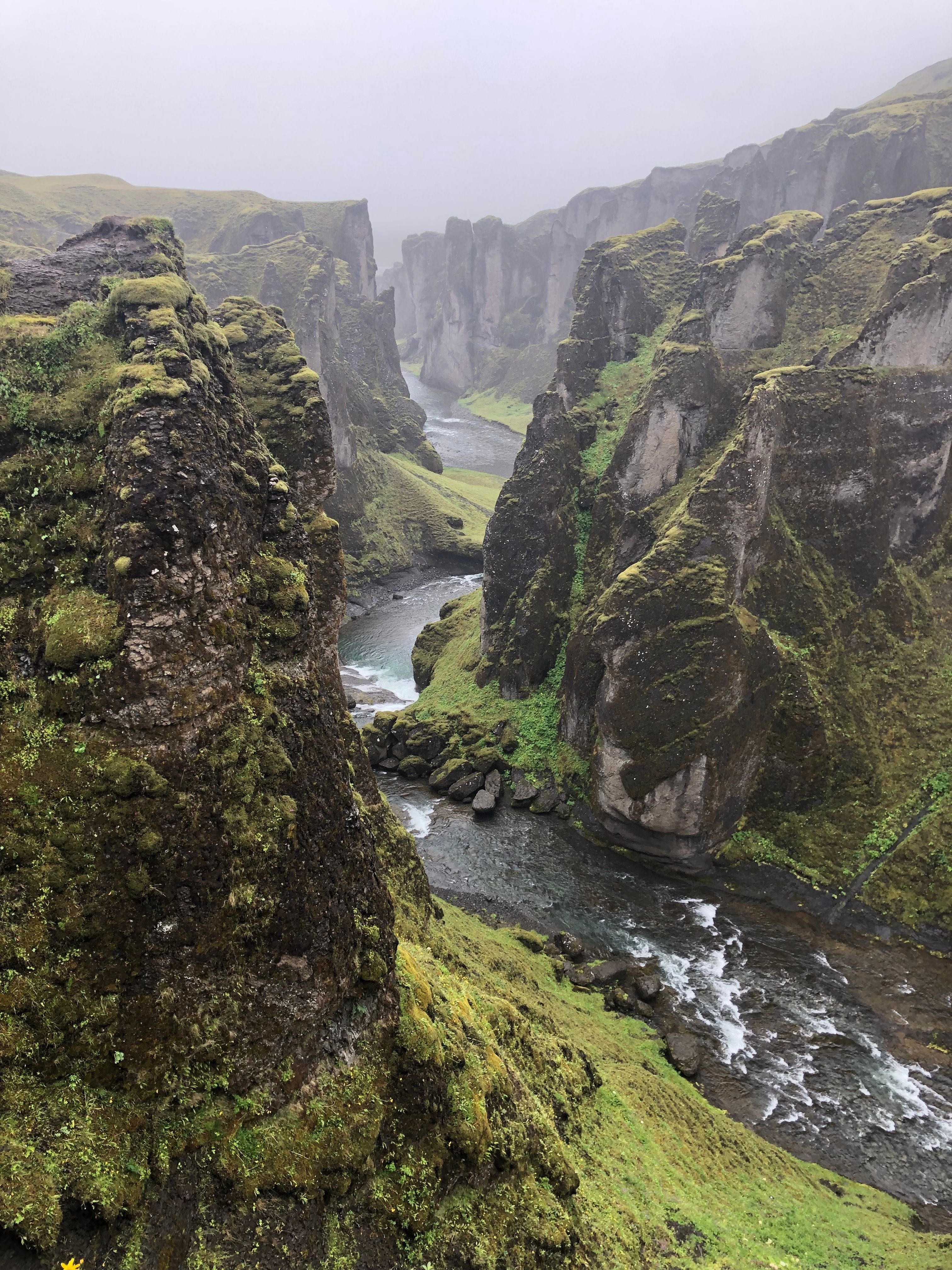 Body of Water Between Mountains · Free Stock Photo