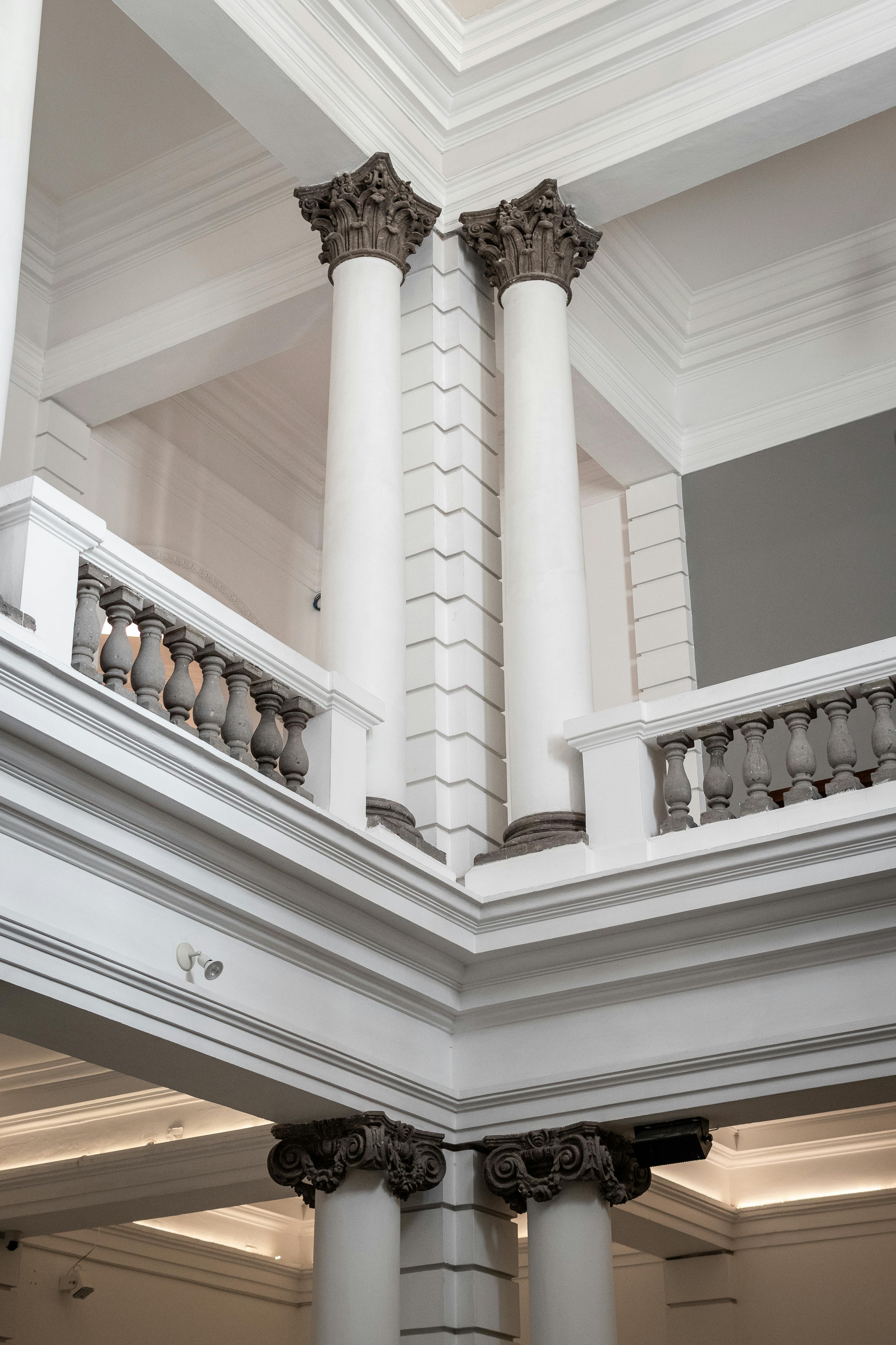 White Columns on Mezzanine · Free Stock Photo