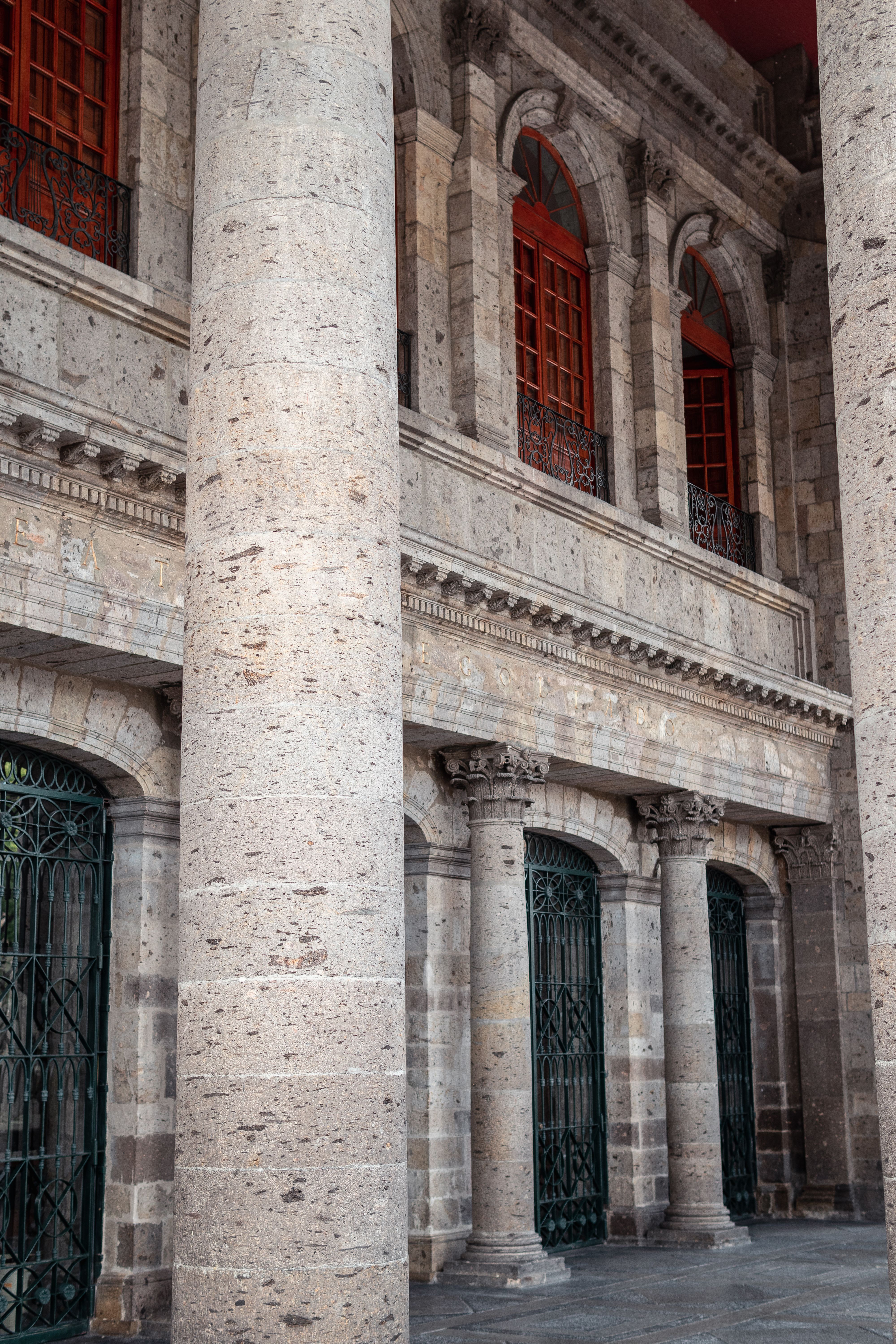 Columns and Bars on Building Windows · Free Stock Photo