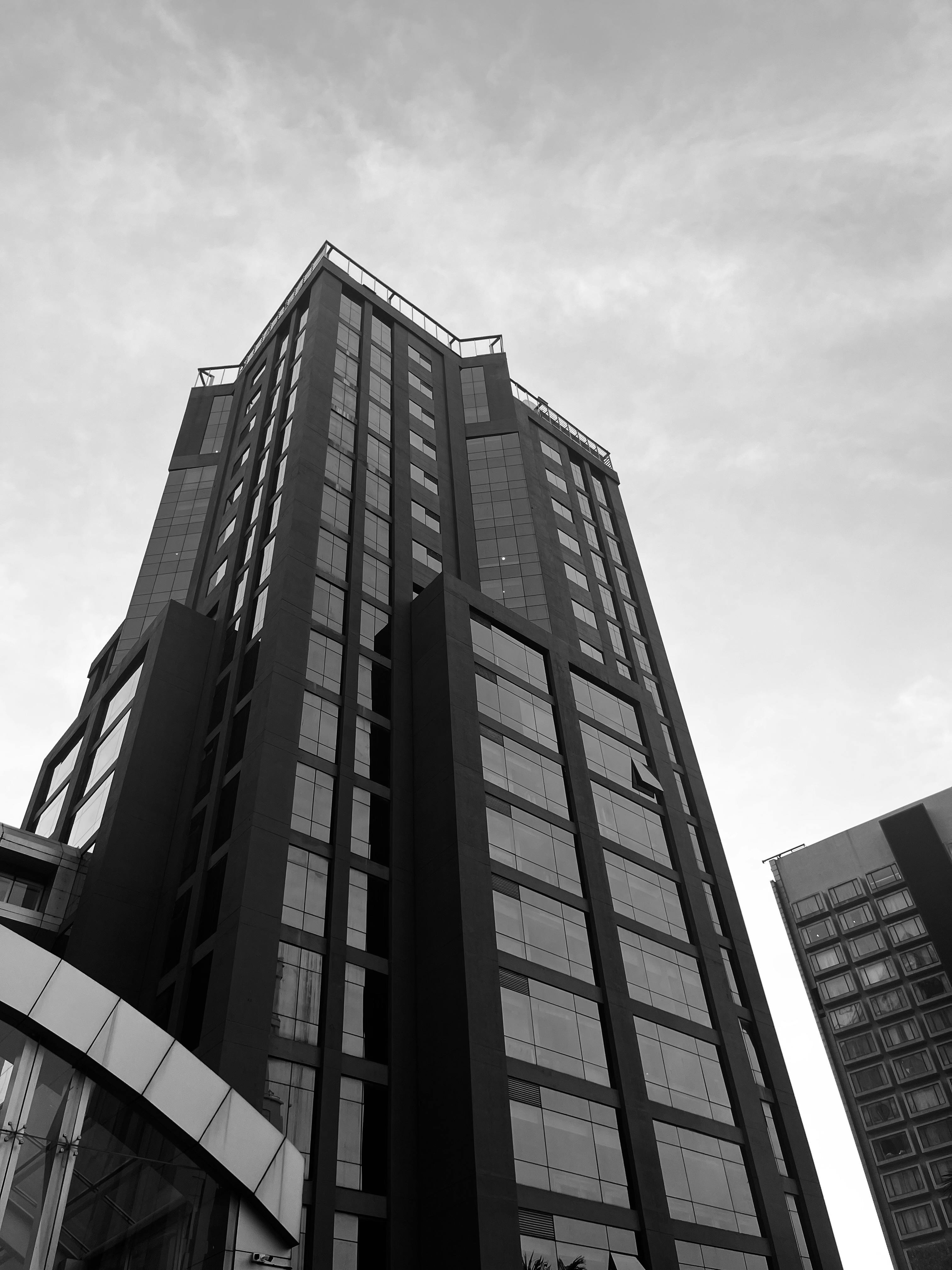 Low Angle Shot of a Modern Skyscraper in City · Free Stock Photo